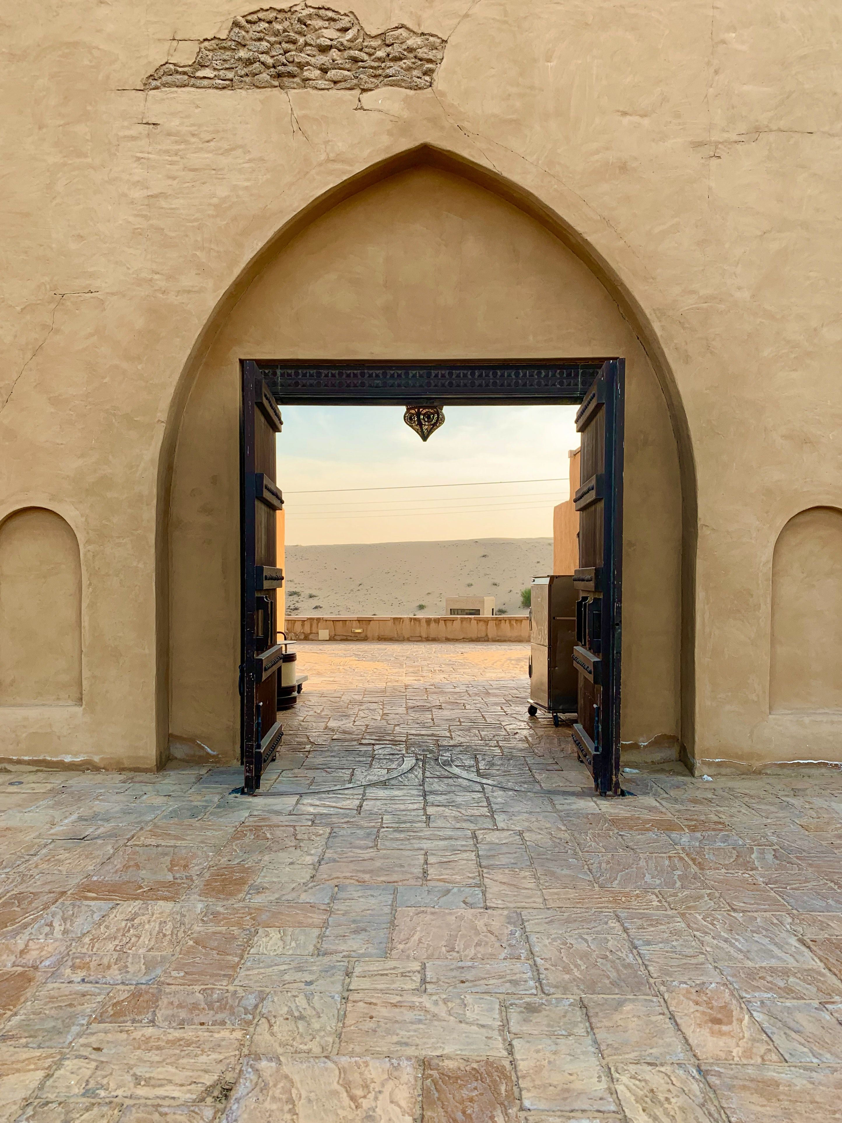 View through the Open Doors of an Old Building · Free Stock Photo