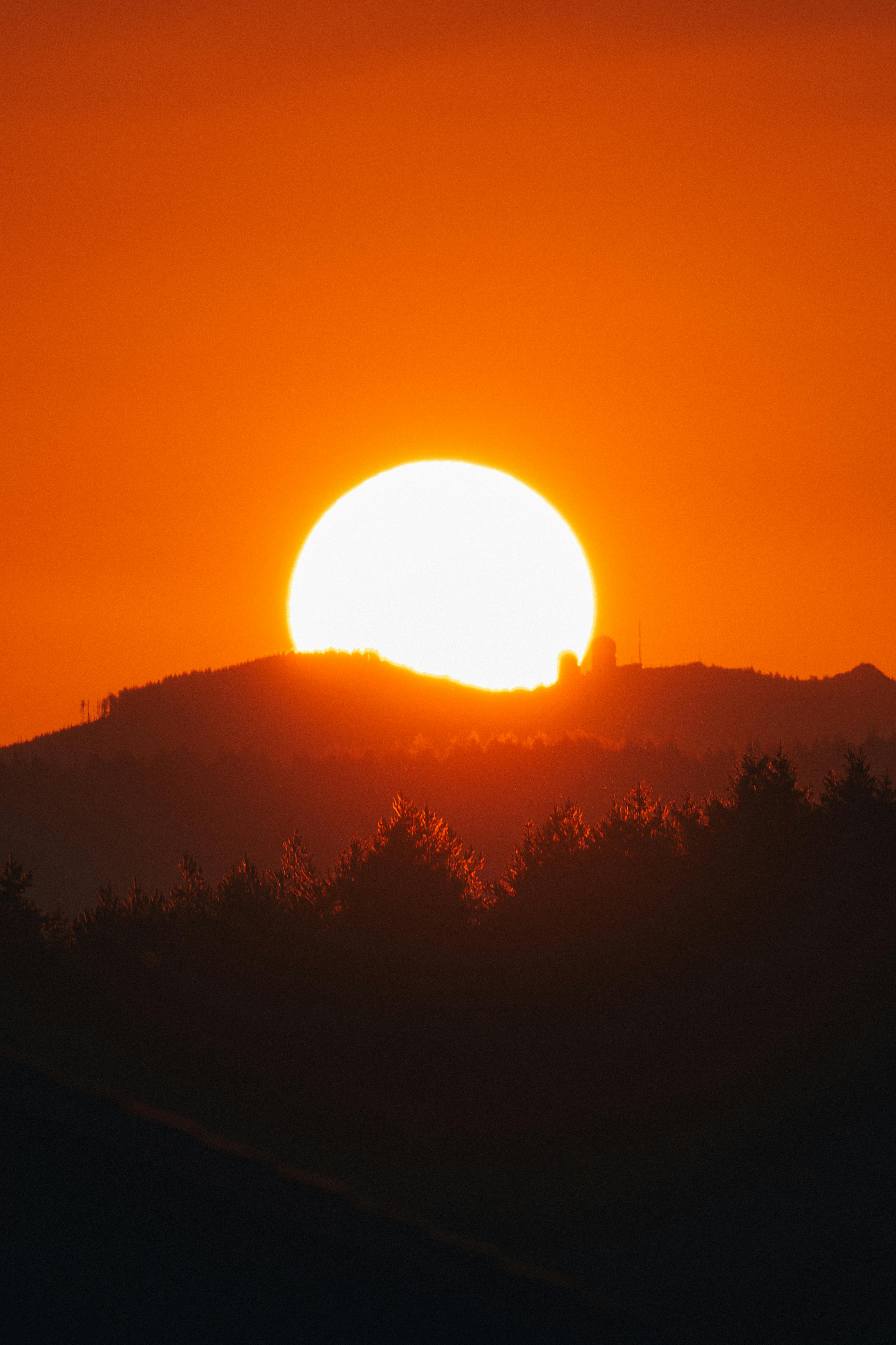 Sun Setting over the Hill · Free Stock Photo