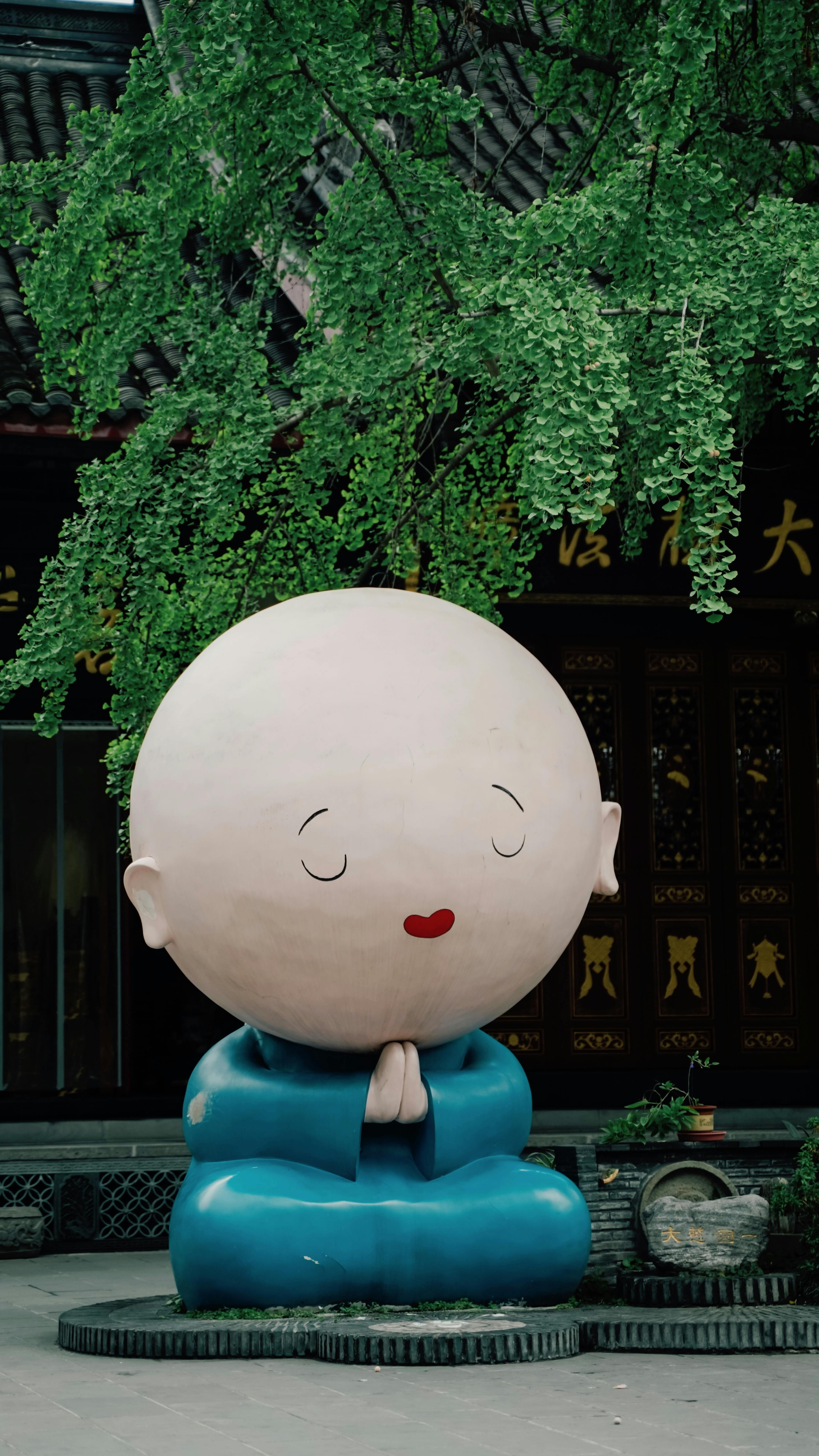 Sculpture of a Praying Boy with Large Round Head in Chengdu, China ...