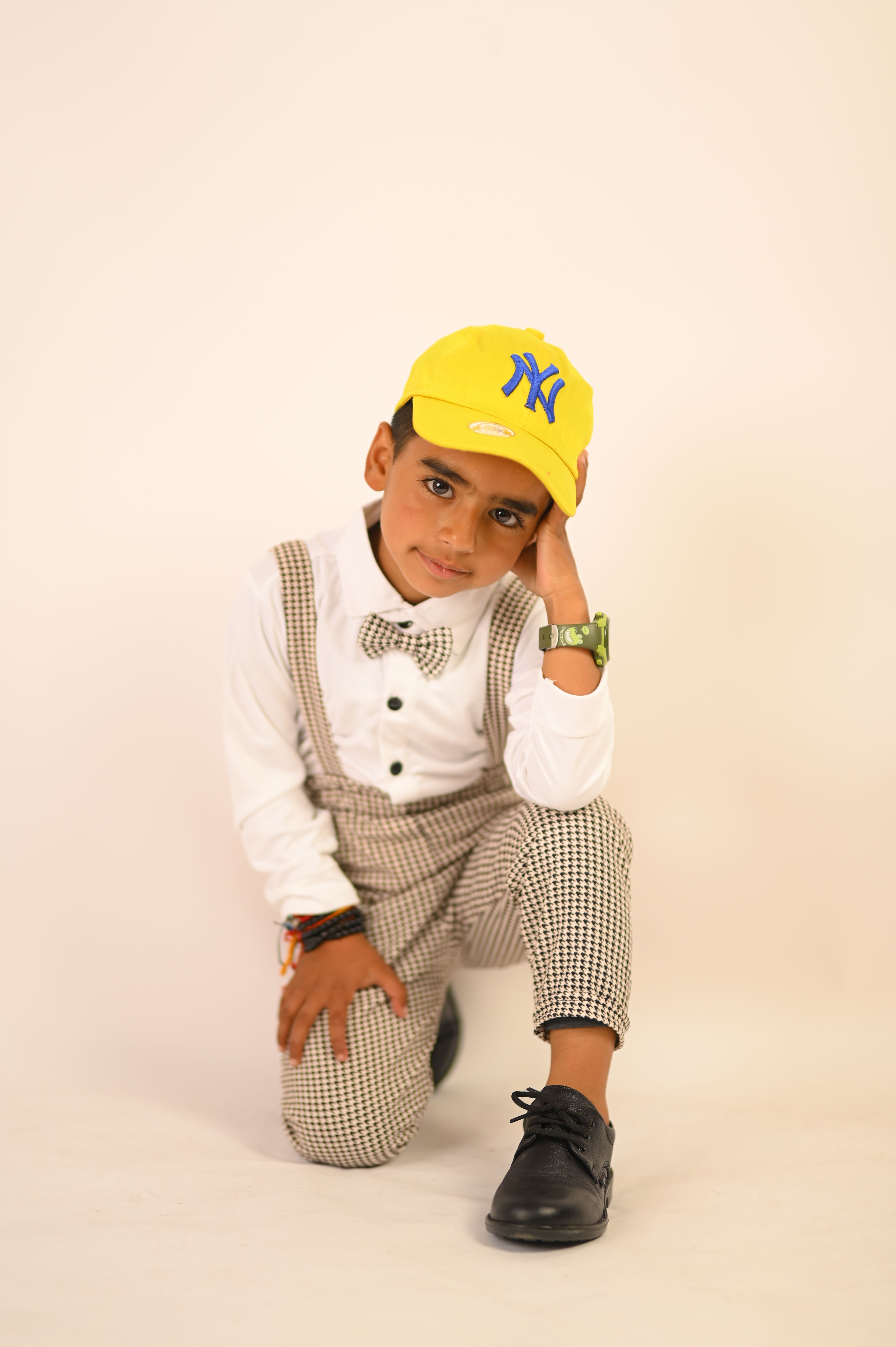 Boy Wearing Elegant Suit and Cap · Free Stock Photo