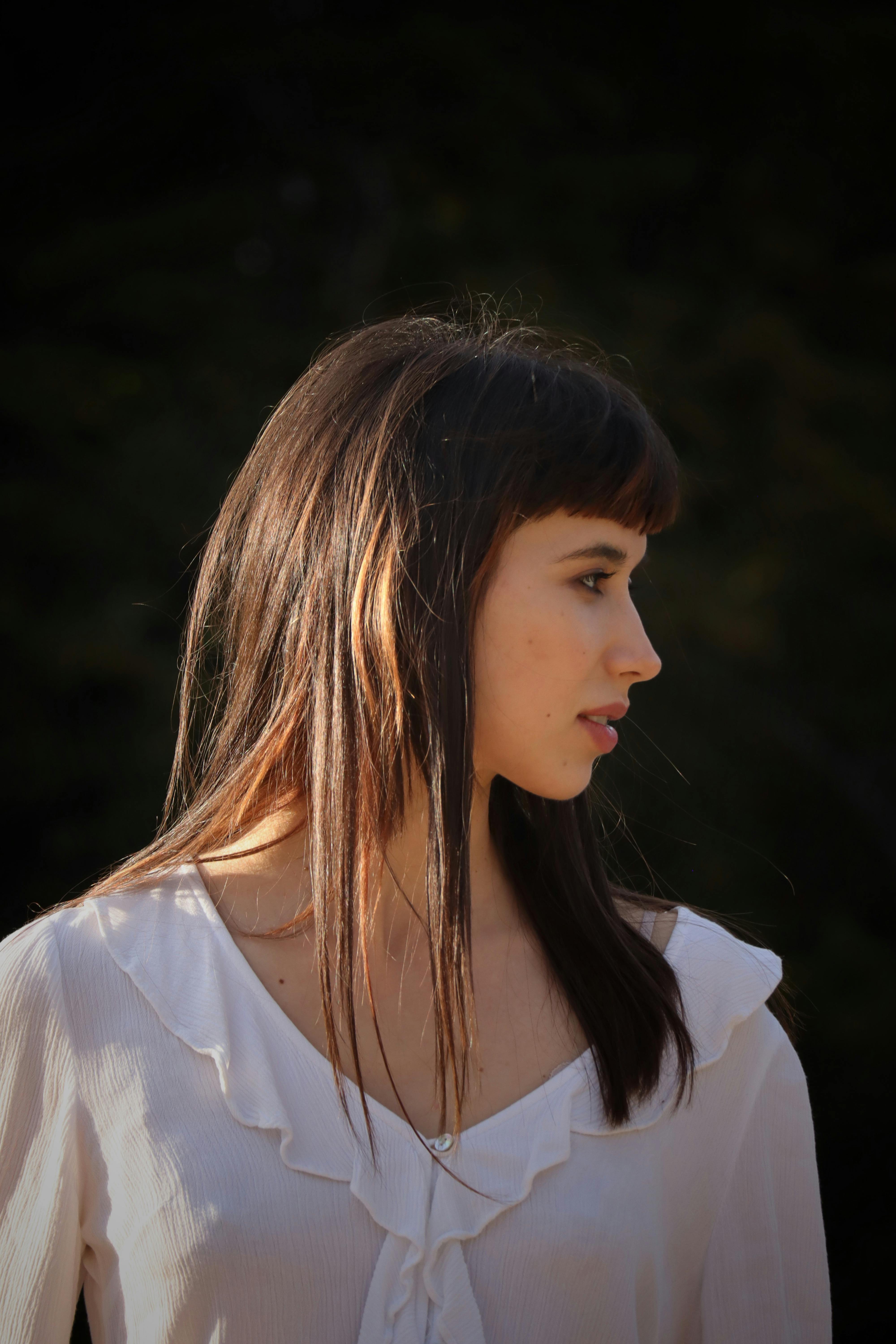 Woman Wearing a White Blouse · Free Stock Photo