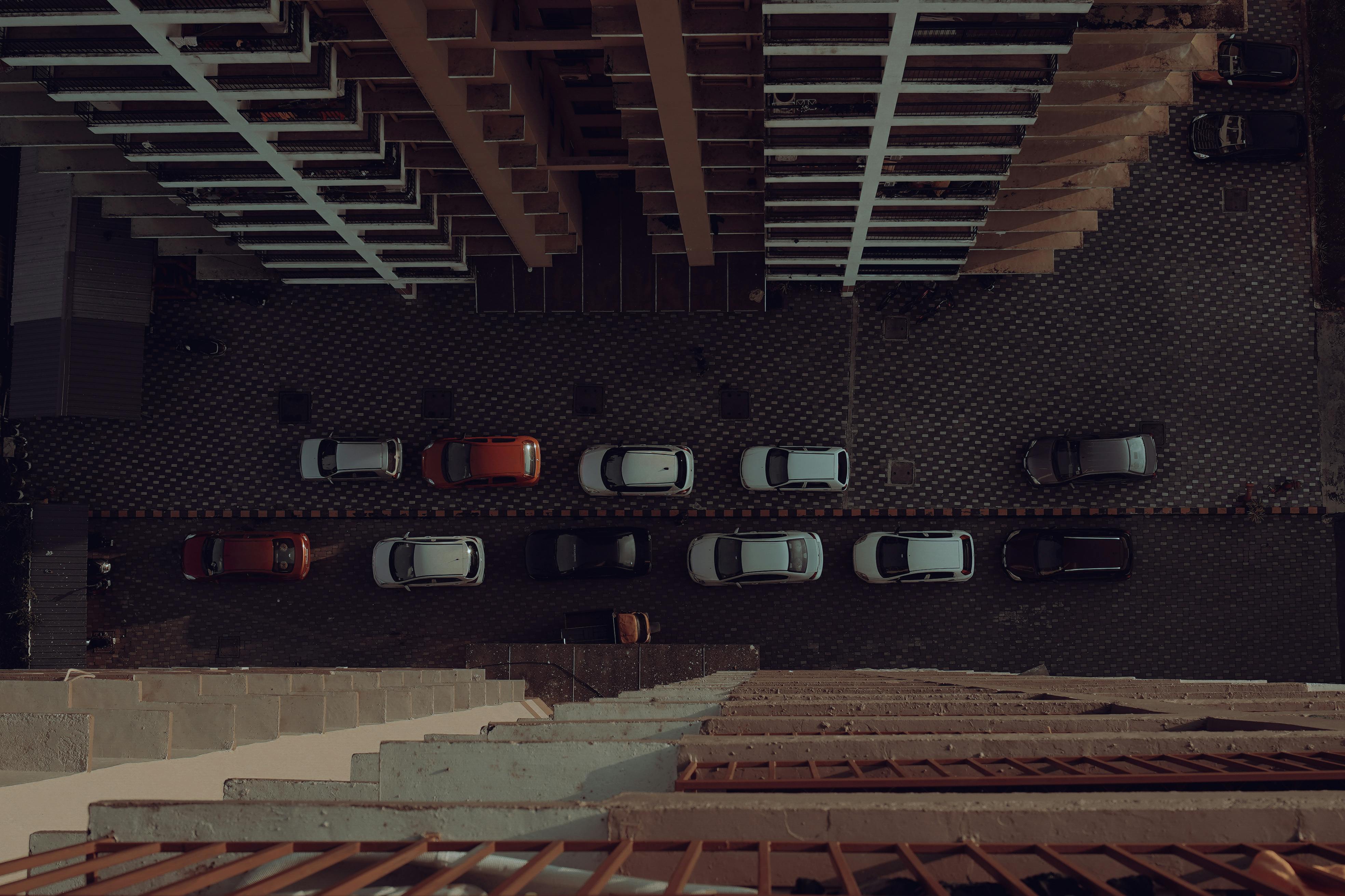 Top View of Cars on the Street between Buildings in City · Free Stock Photo