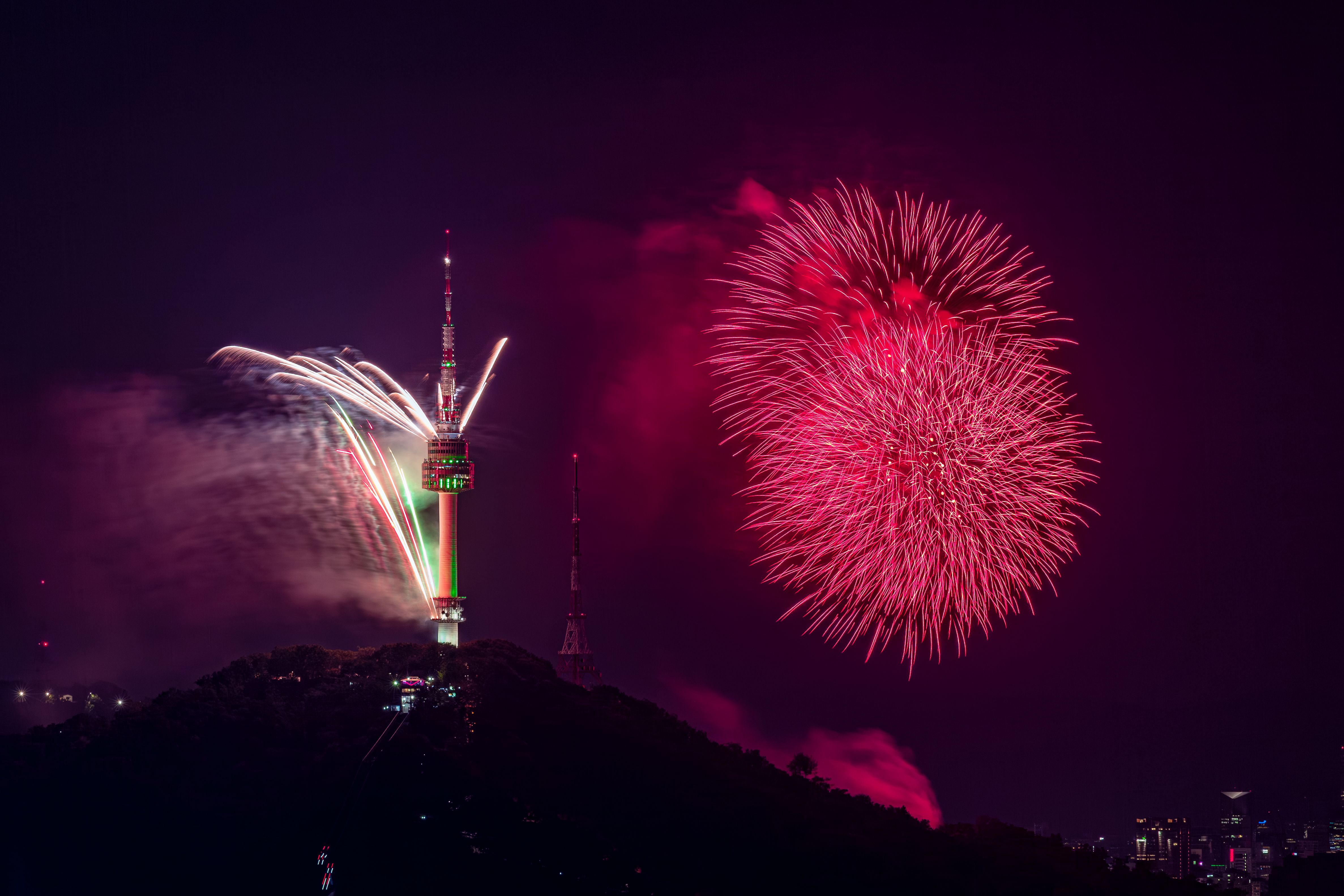 Fireworks Display Near High Rise Buildings during Nighttime · Free ...