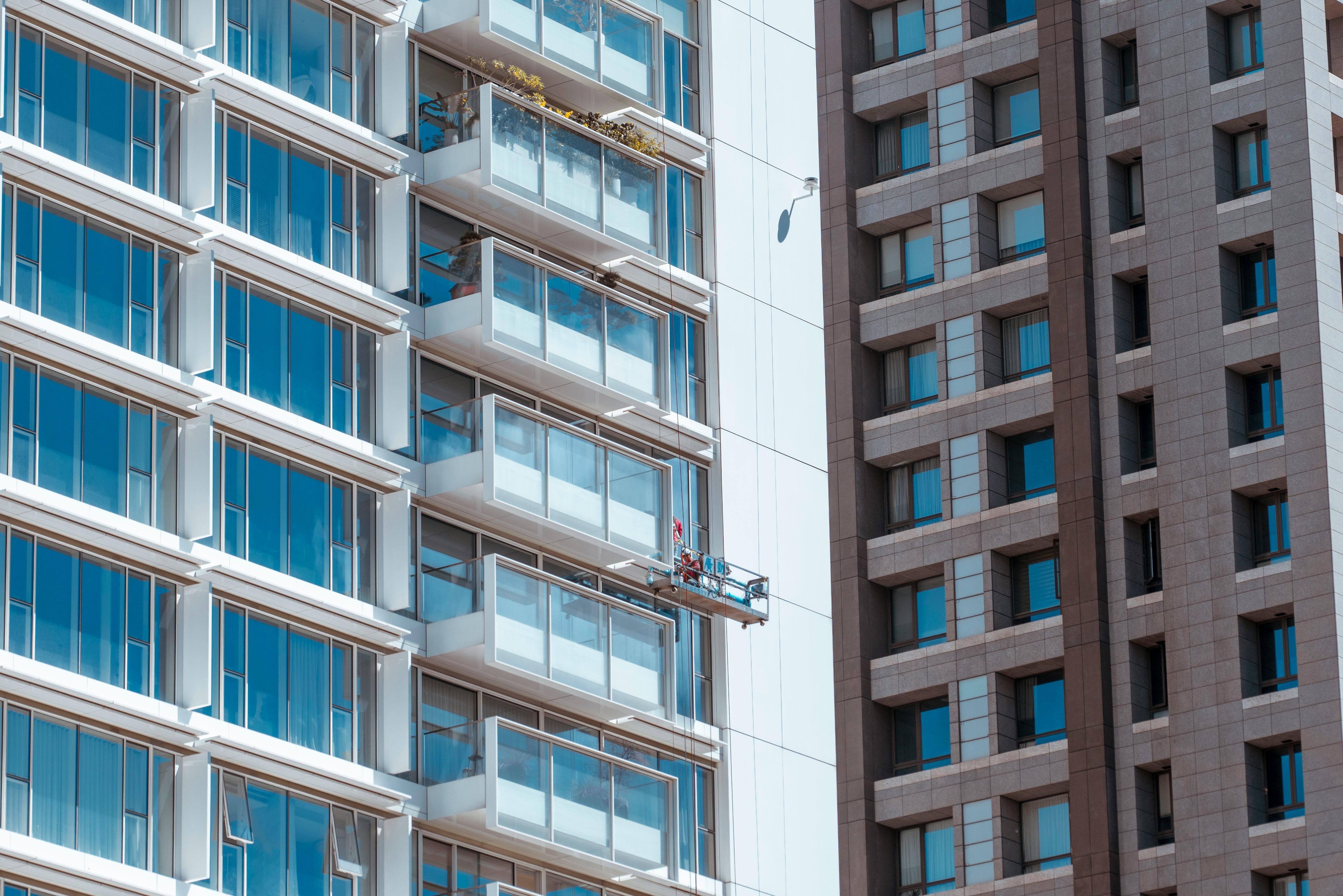Suspended Scaffold Next to the Balconies of an Apartment Building ...