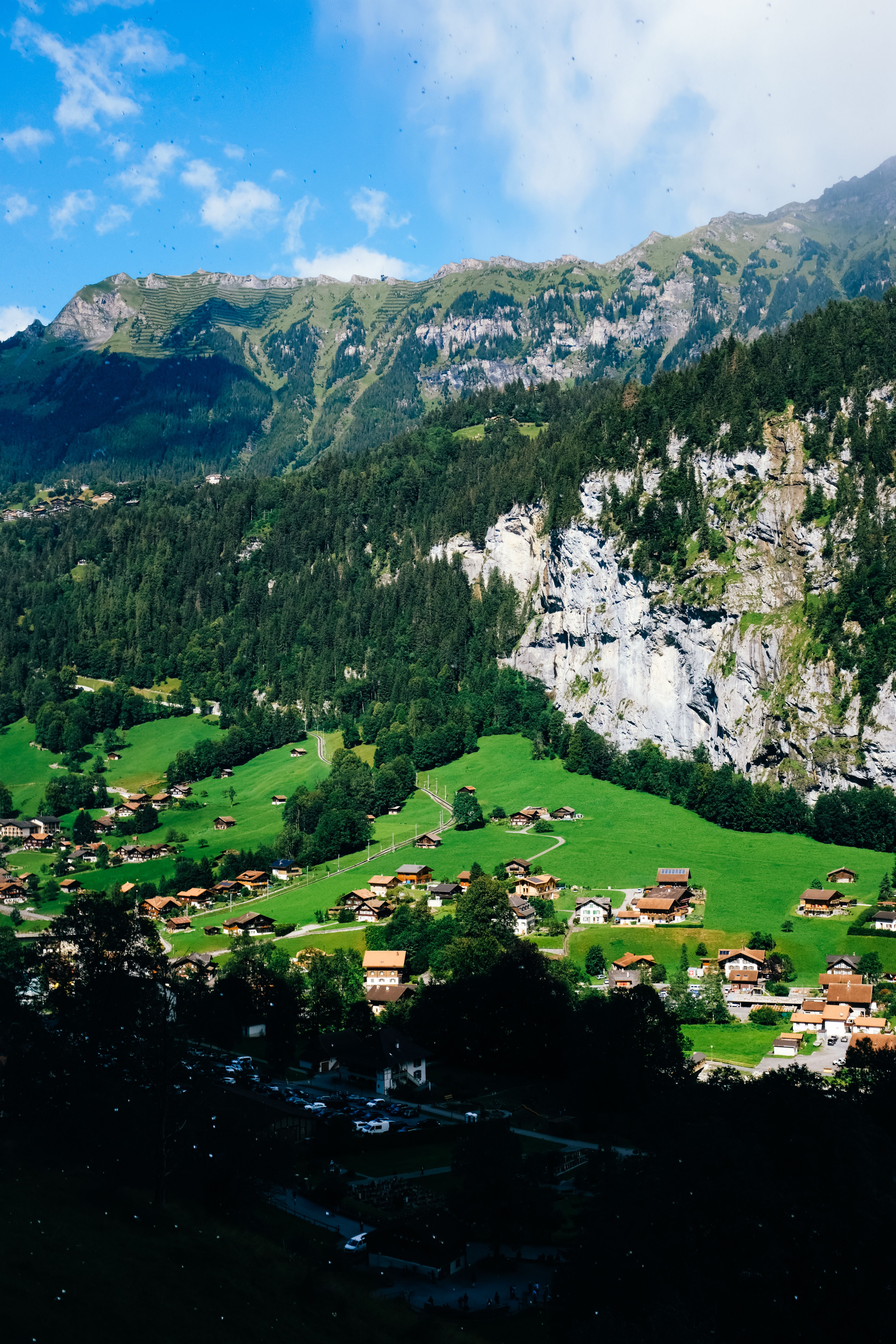 Castle in Green Valley near Rock Mountains · Free Stock Photo