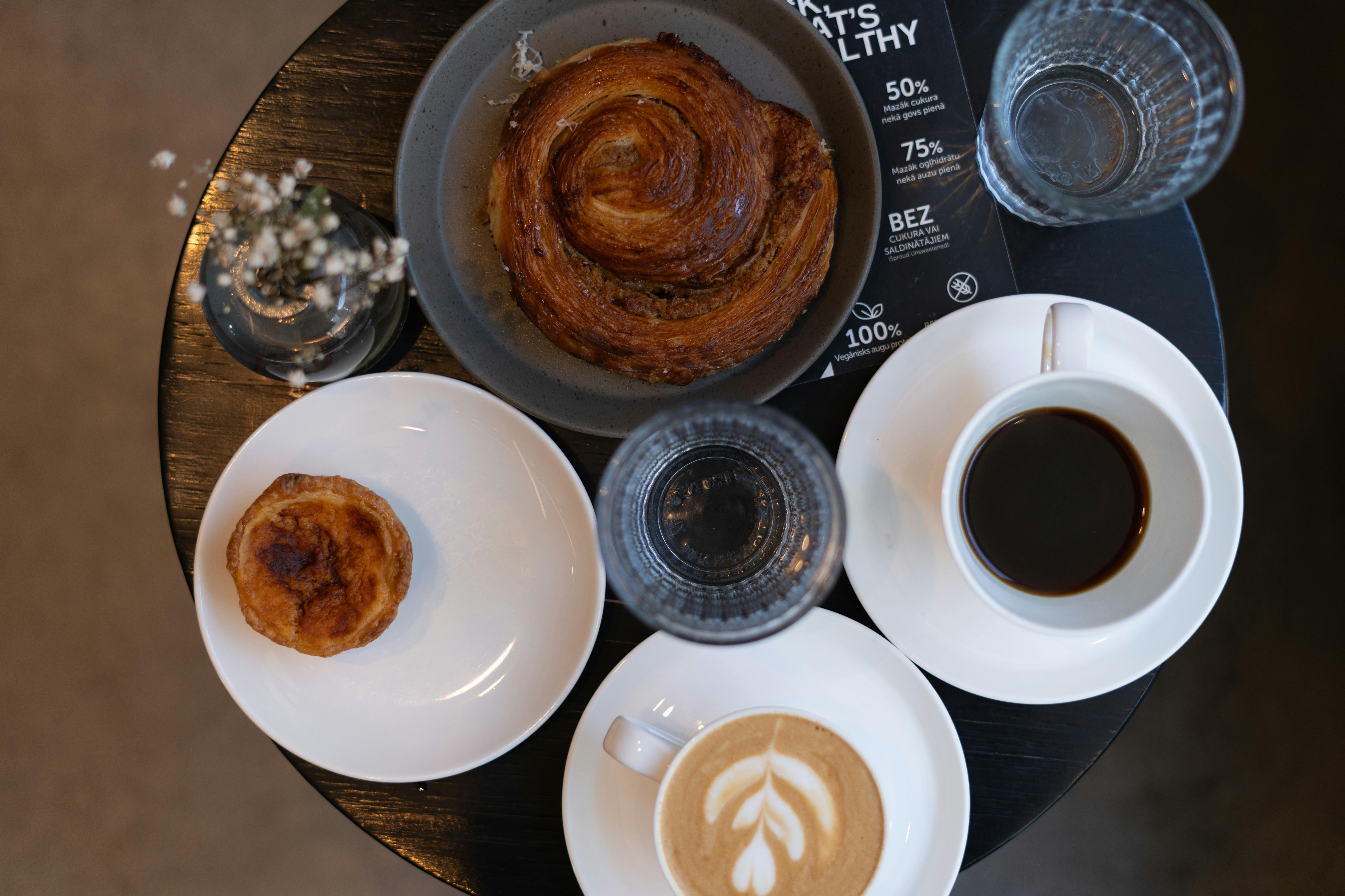 Coffee and Pastry on a Table · Free Stock Photo
