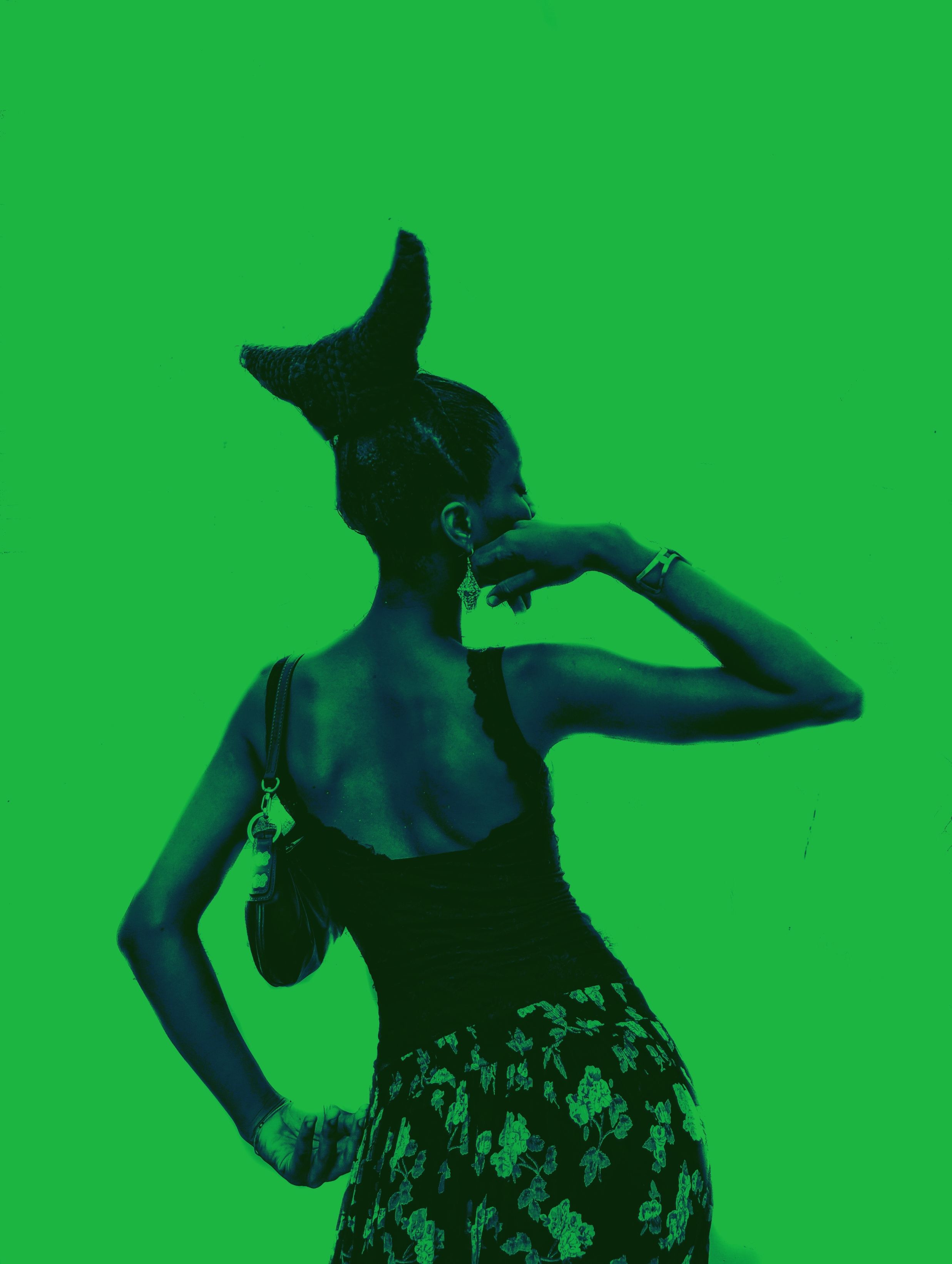 Woman Posing on Green Background · Free Stock Photo