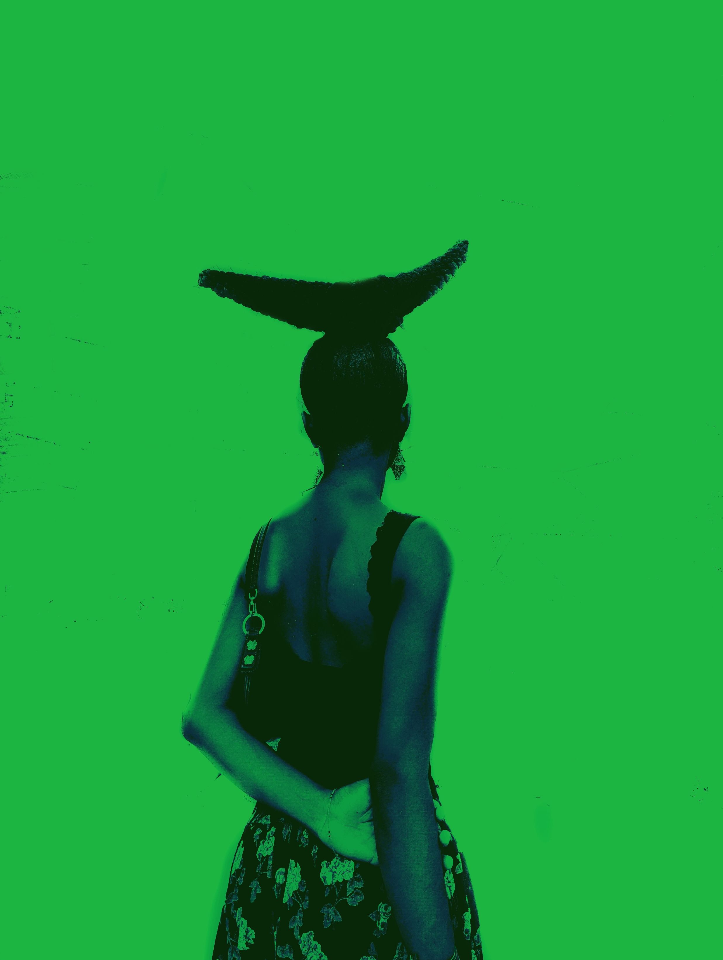 Back View of Model on Green Background · Free Stock Photo