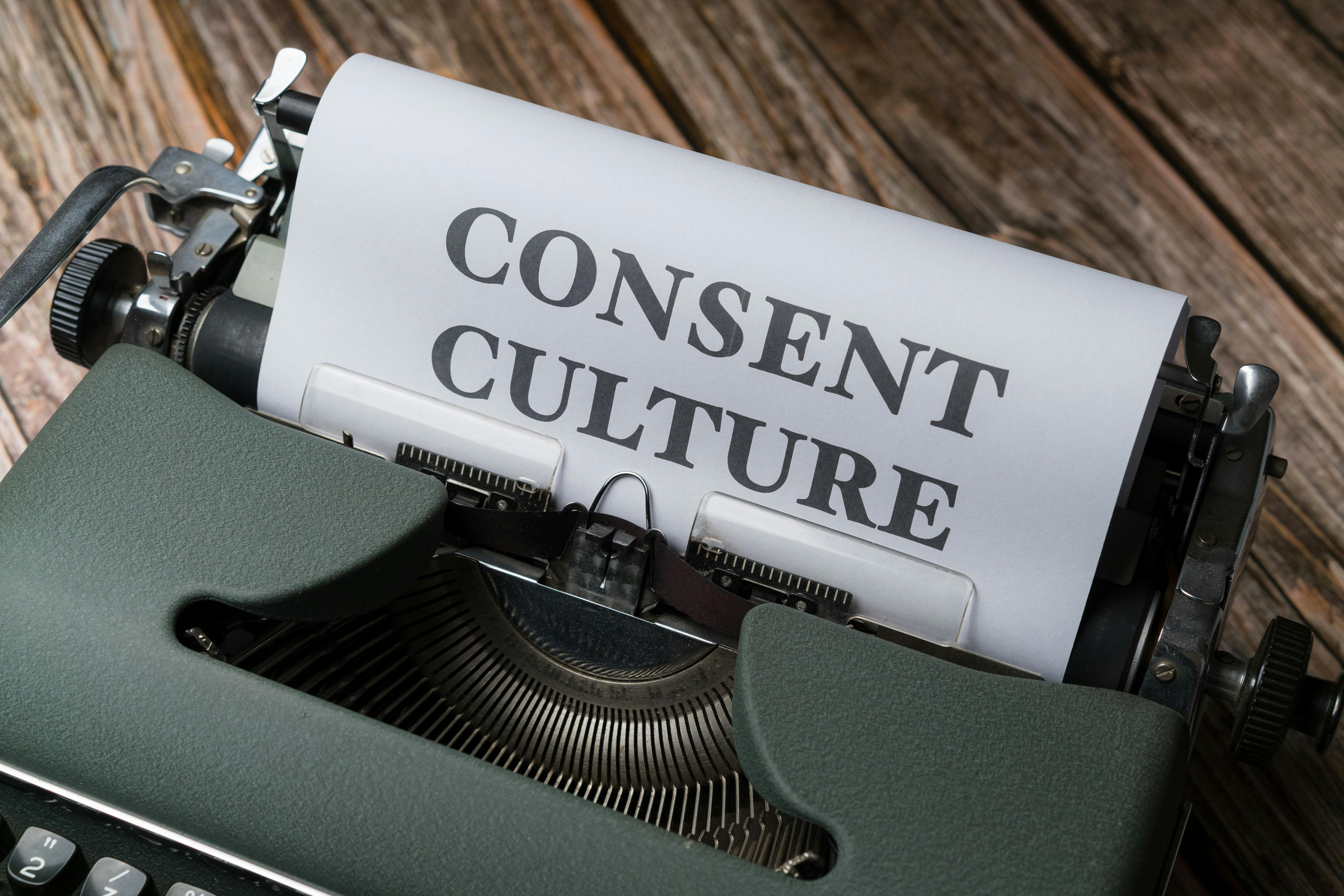 A typewriter with the word consent culture on it · Free Stock Photo