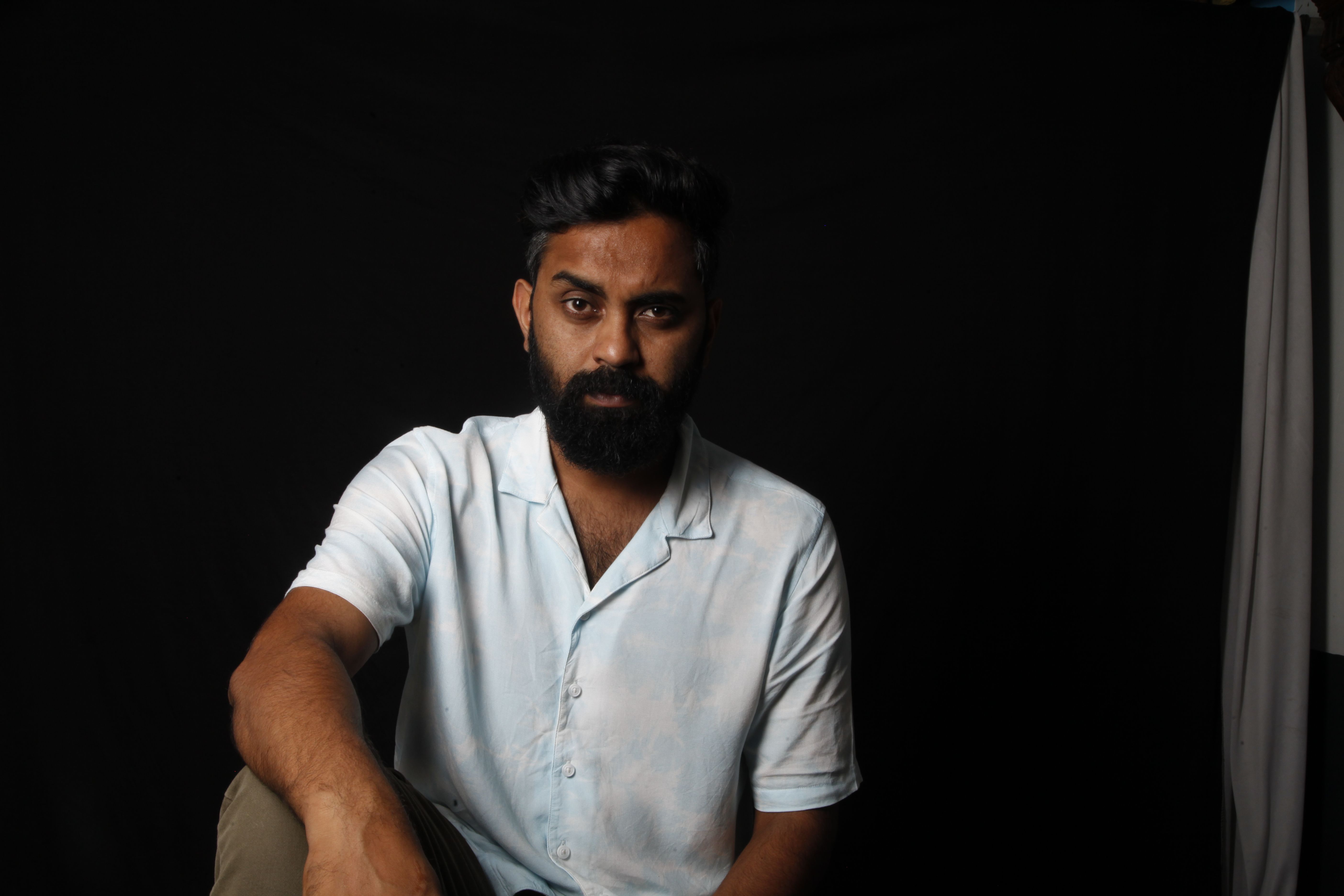 Portrait of Man with a Beard in Shadow · Free Stock Photo