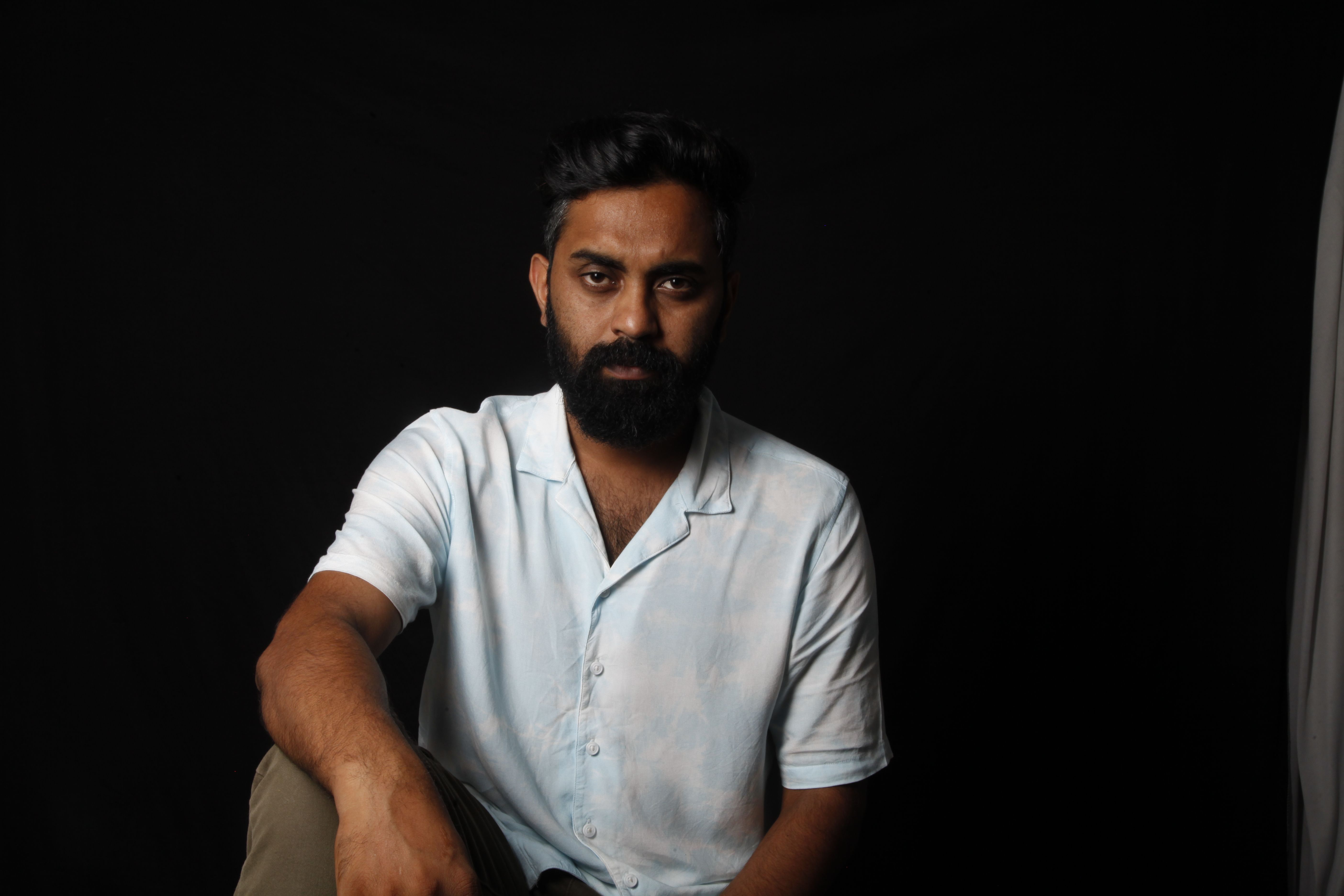 Portrait of Man with a Beard in Shadow · Free Stock Photo