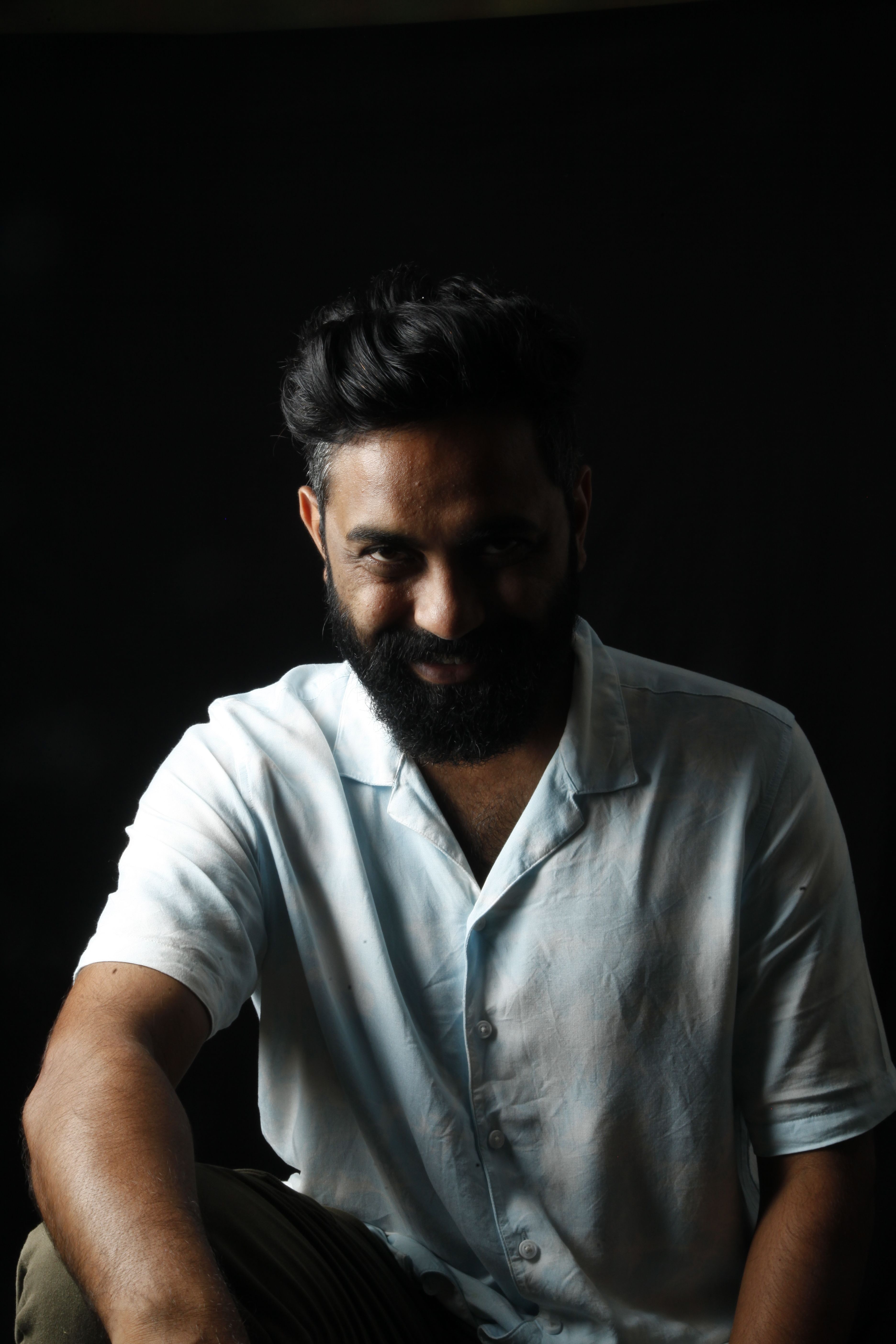 Portrait of Man with a Beard in Shadow · Free Stock Photo