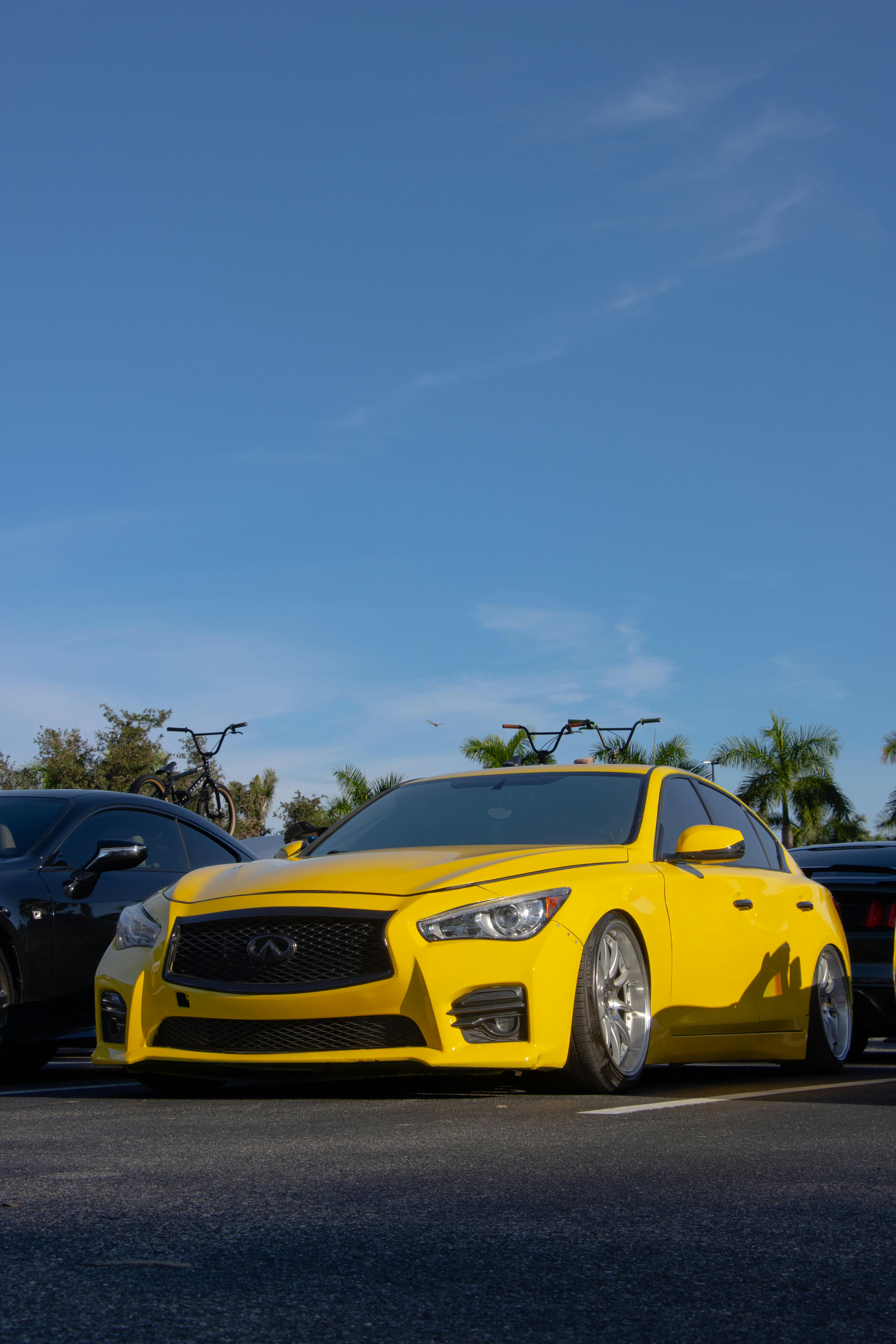 Yellow Infiniti Q50 · Free Stock Photo