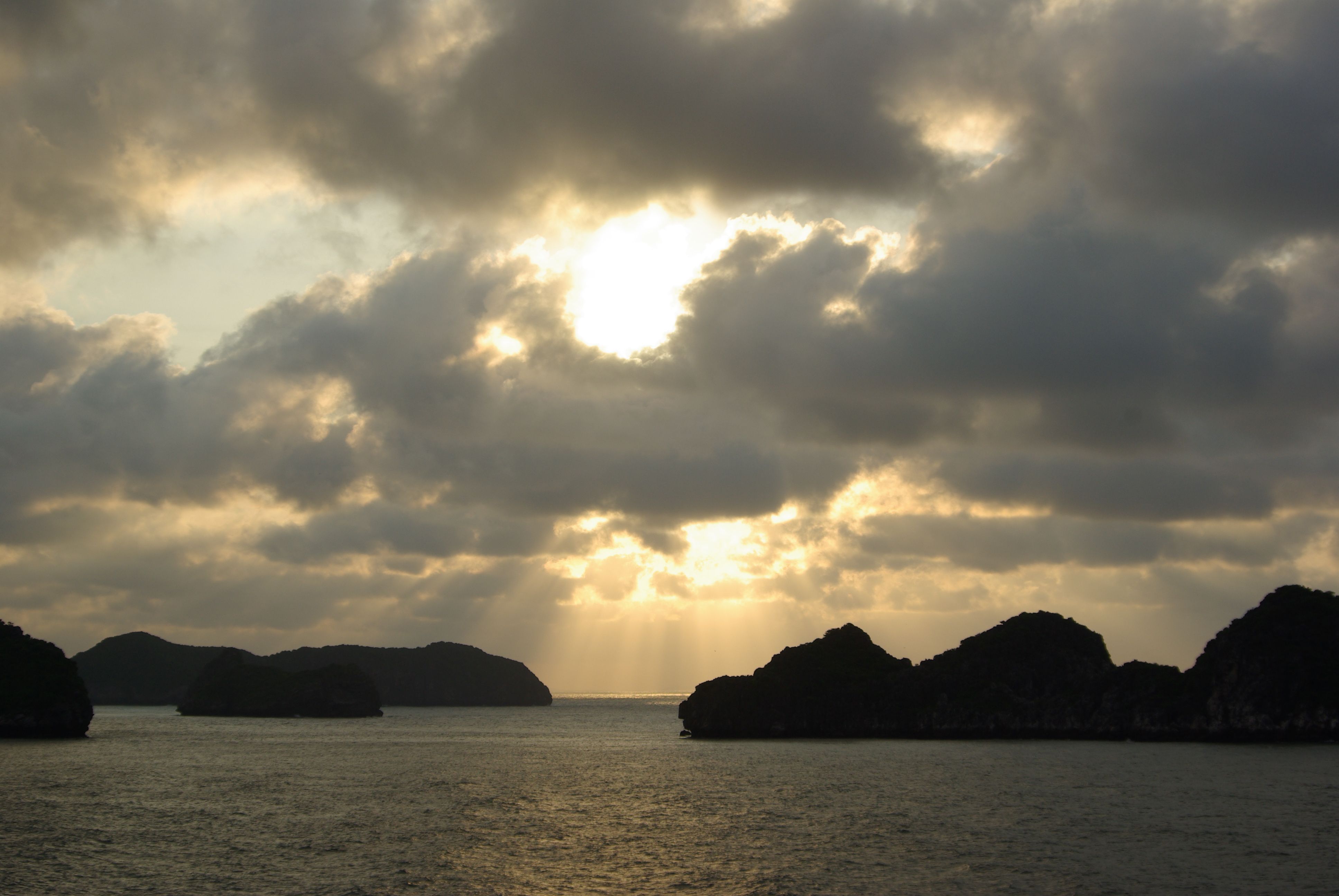 Sun Rays over Sea With Islands · Free Stock Photo