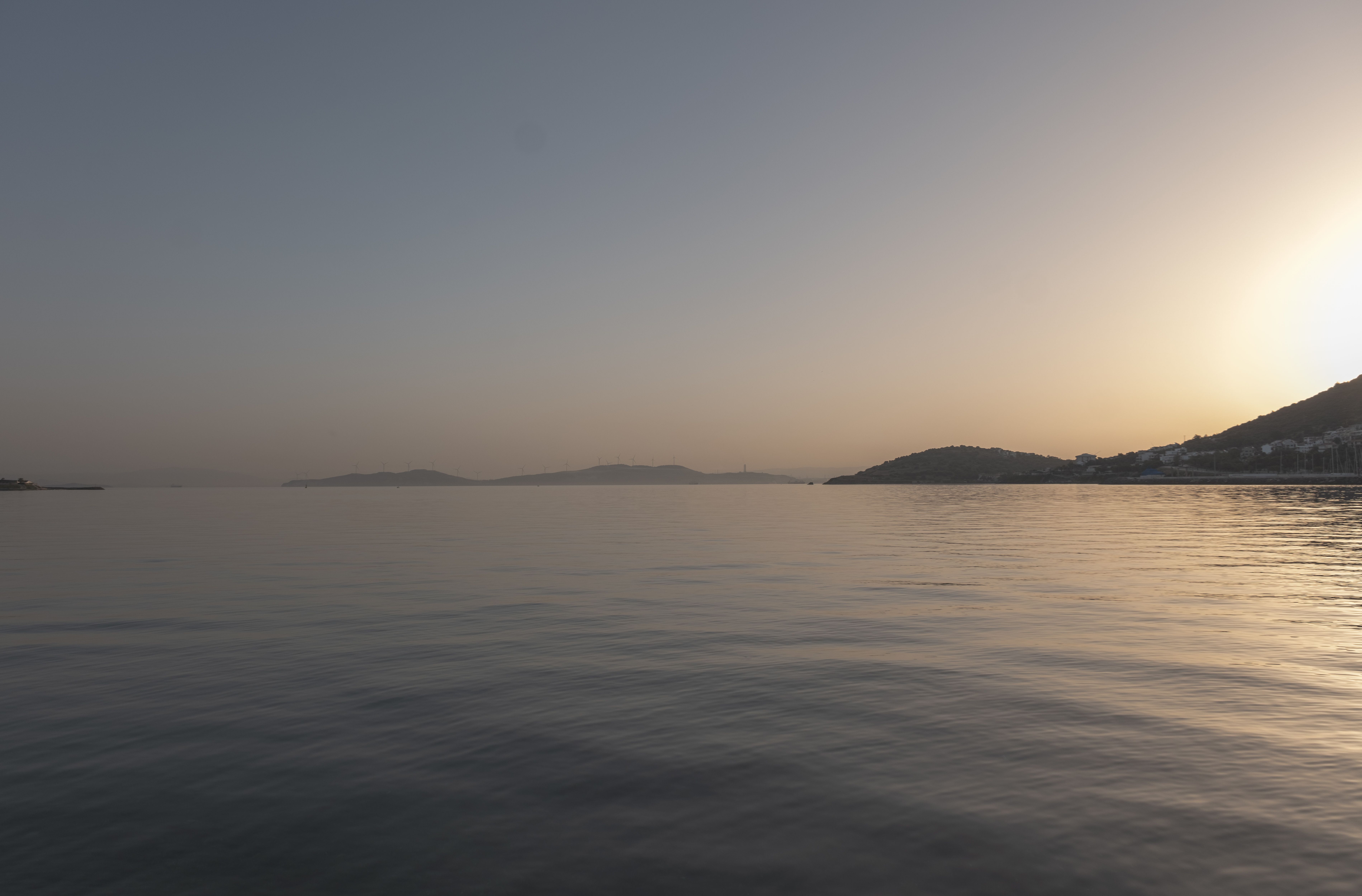 Calm Sea Coast at Sunset · Free Stock Photo