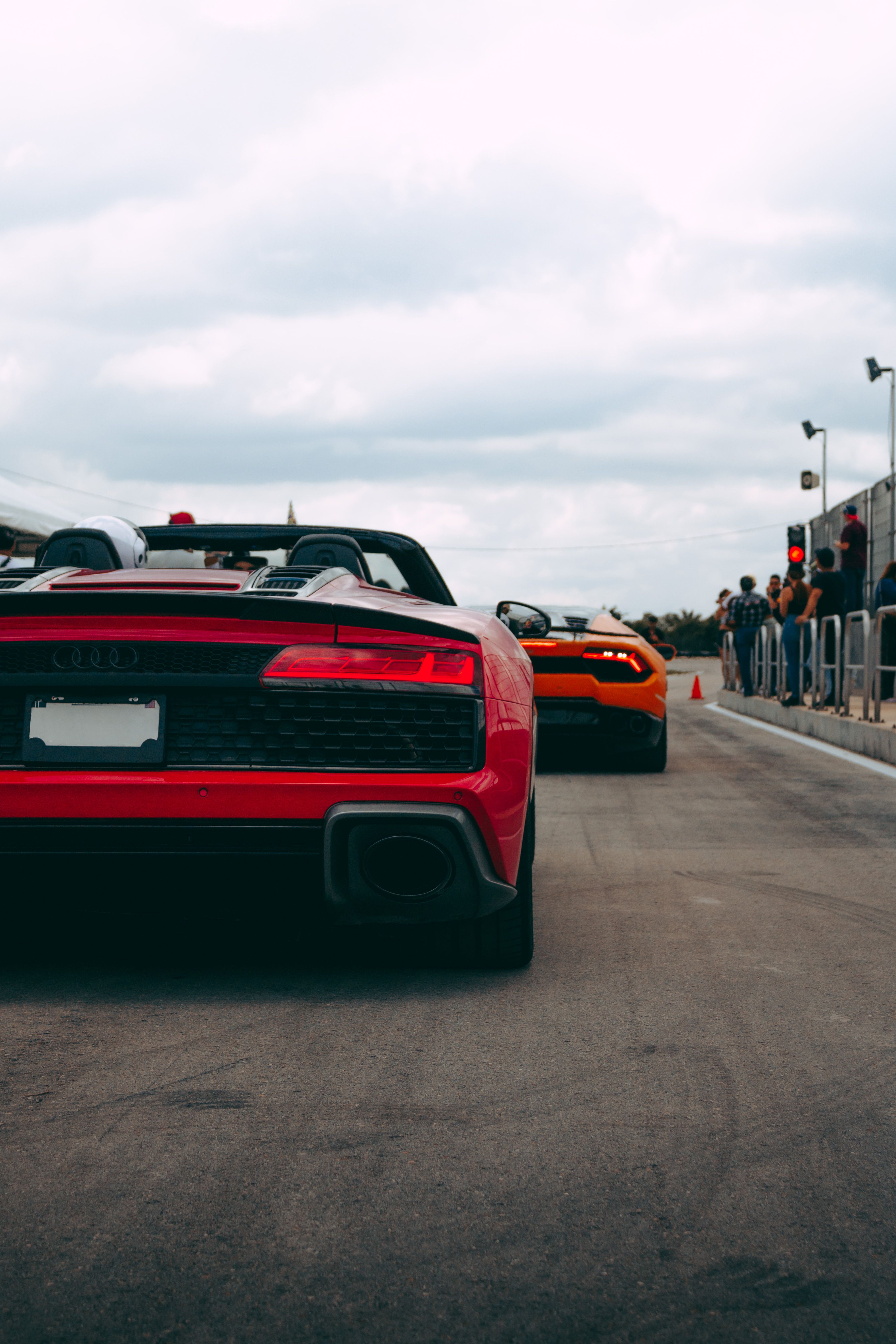 High-Performance Sports Cars on a Race Track · Free Stock Photo