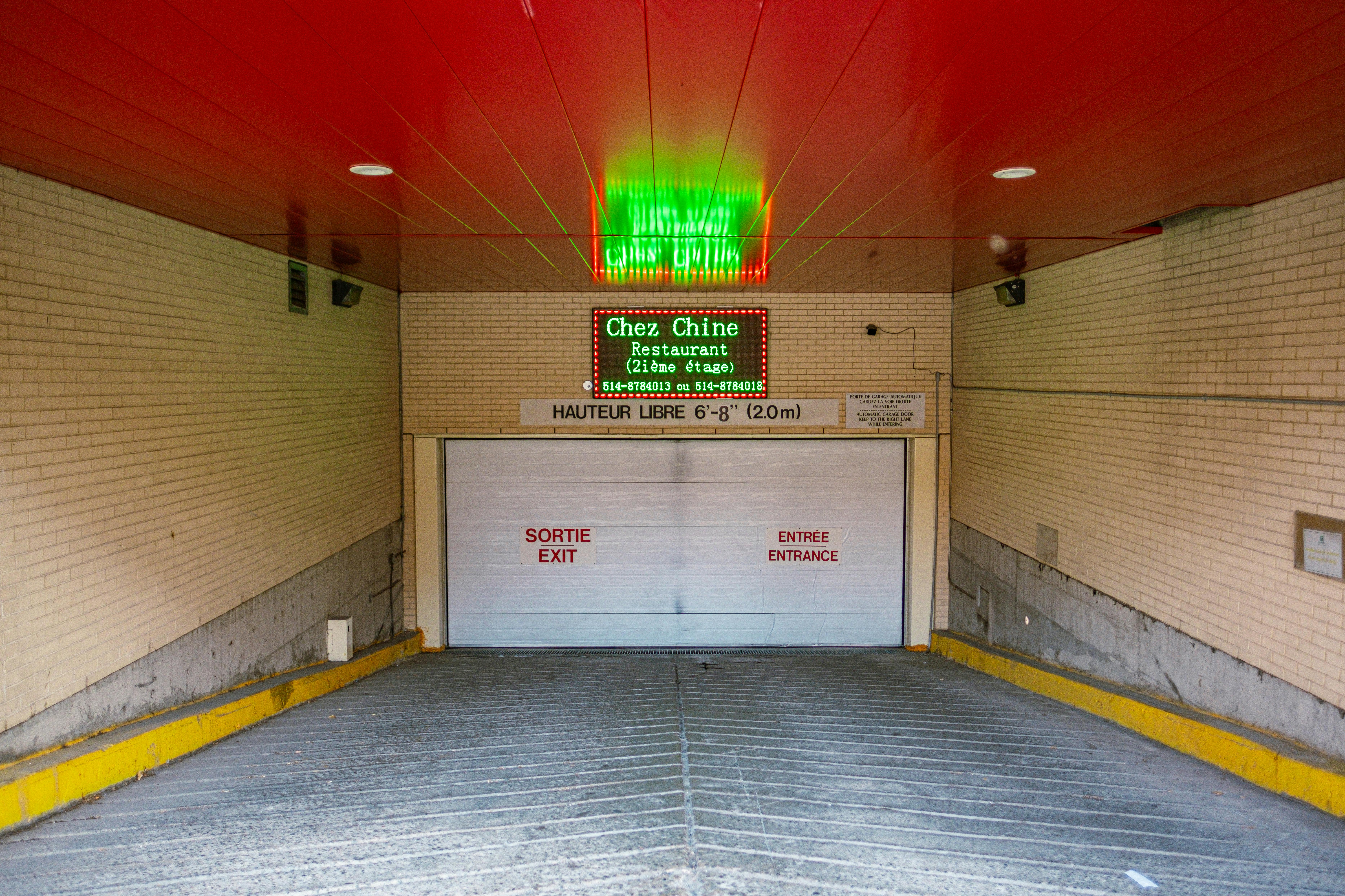 Screen over Parking Lot Door · Free Stock Photo