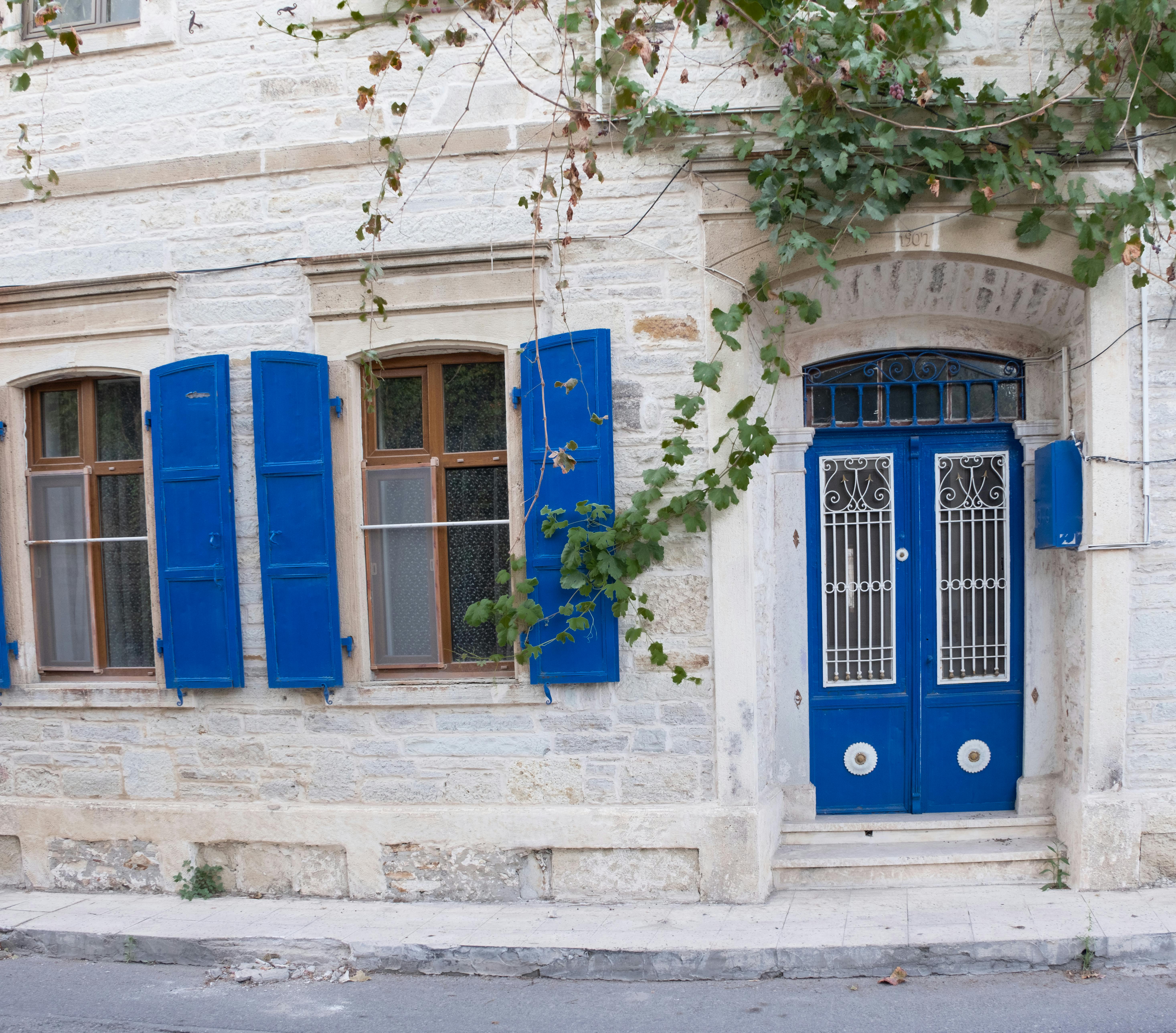 Traditional Residential Building with Blue Doors and Shutters · Free ...