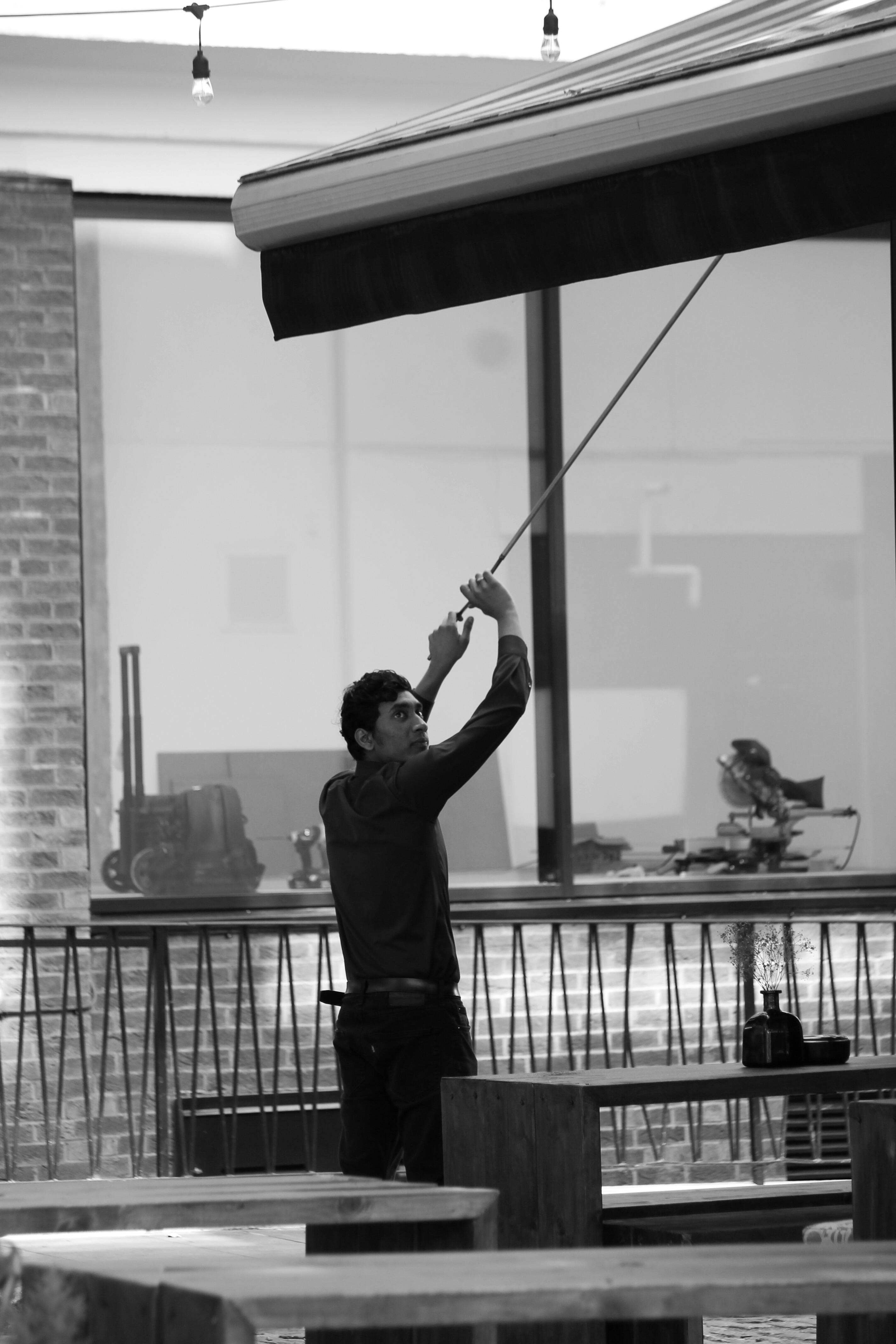 Working Waiter in Black and White · Free Stock Photo
