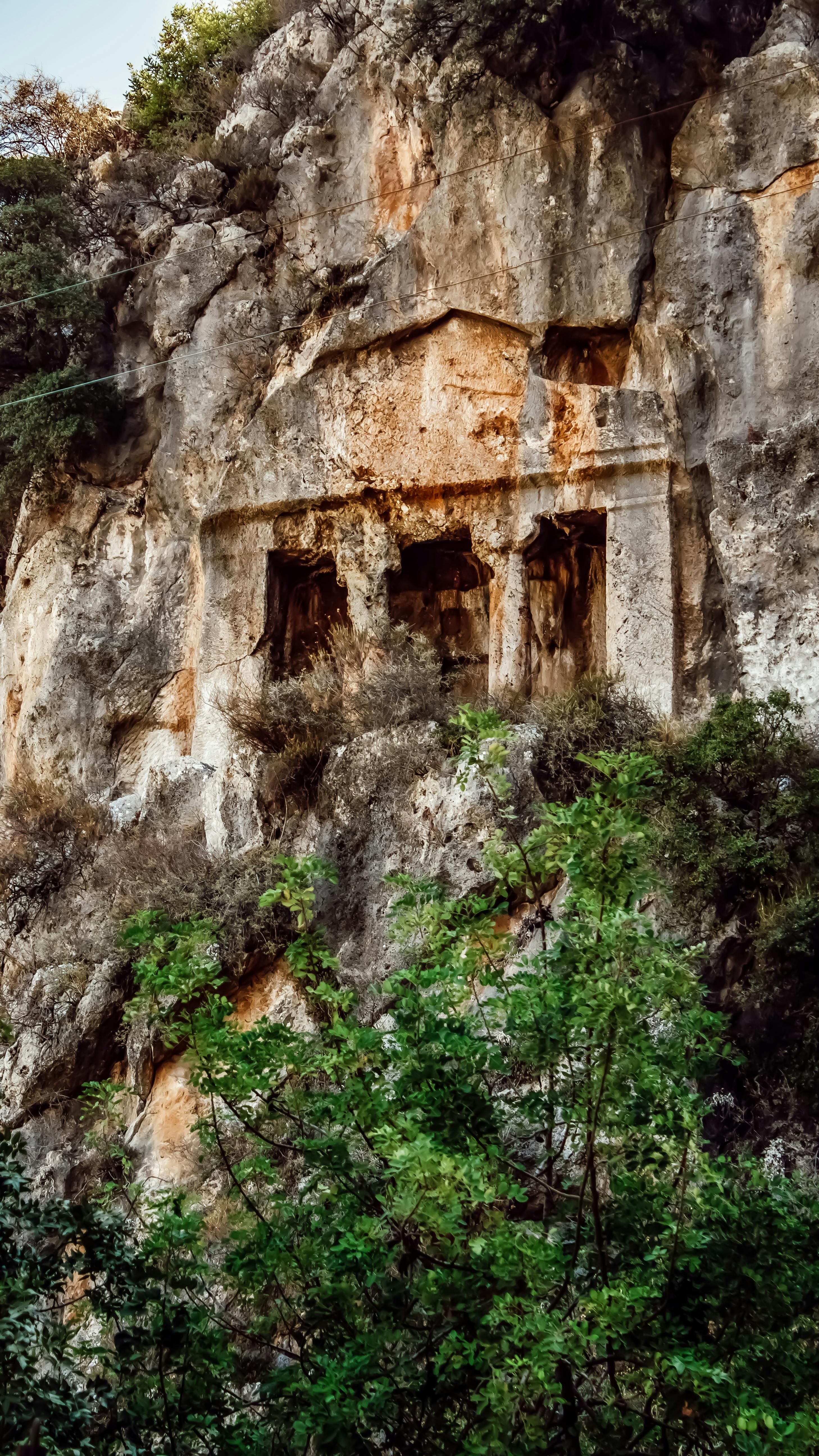 Carving in Barren Rock Wall · Free Stock Photo