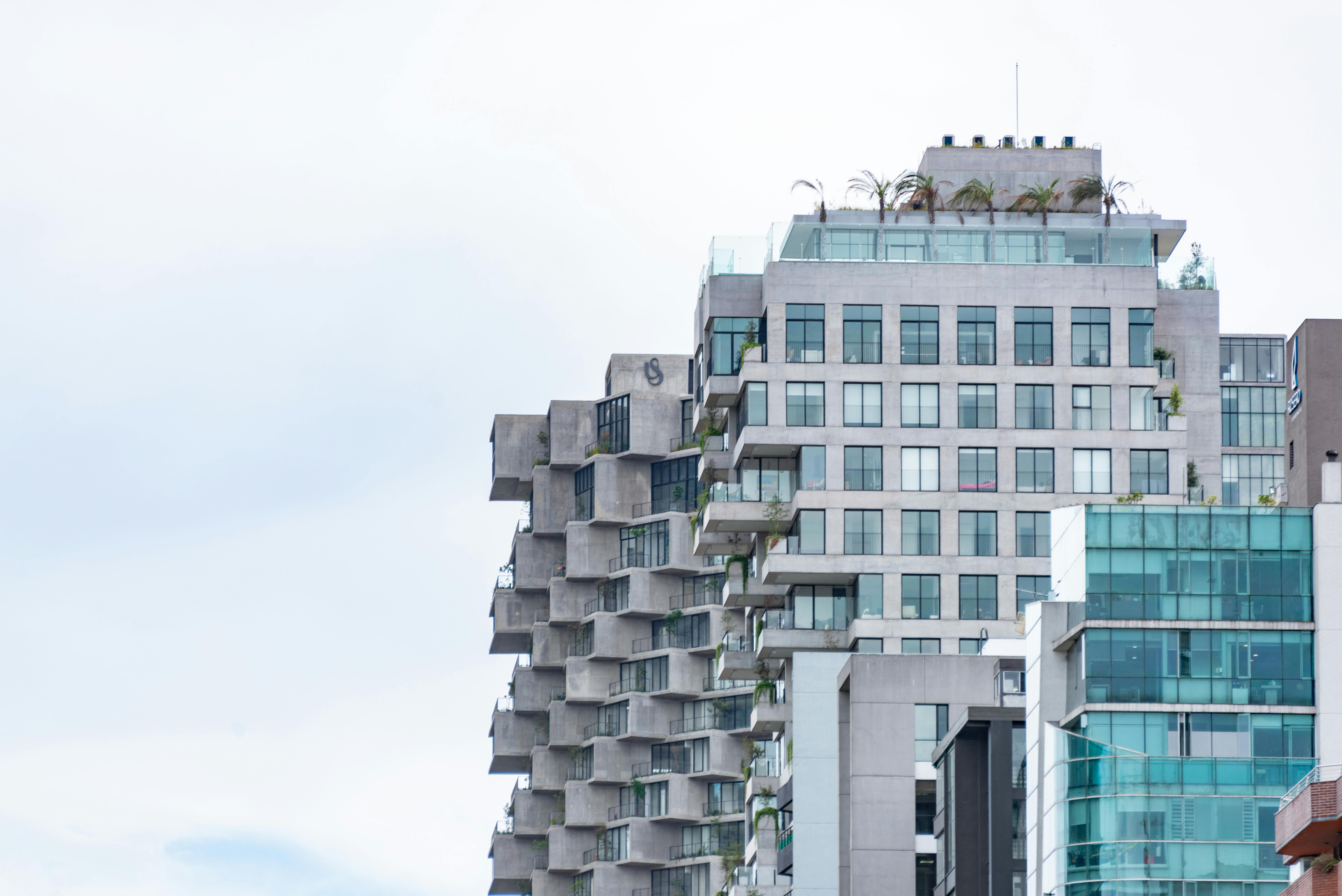 Modern High-Rise Residential Building with a Roof Terrace, Qorner Tower ...