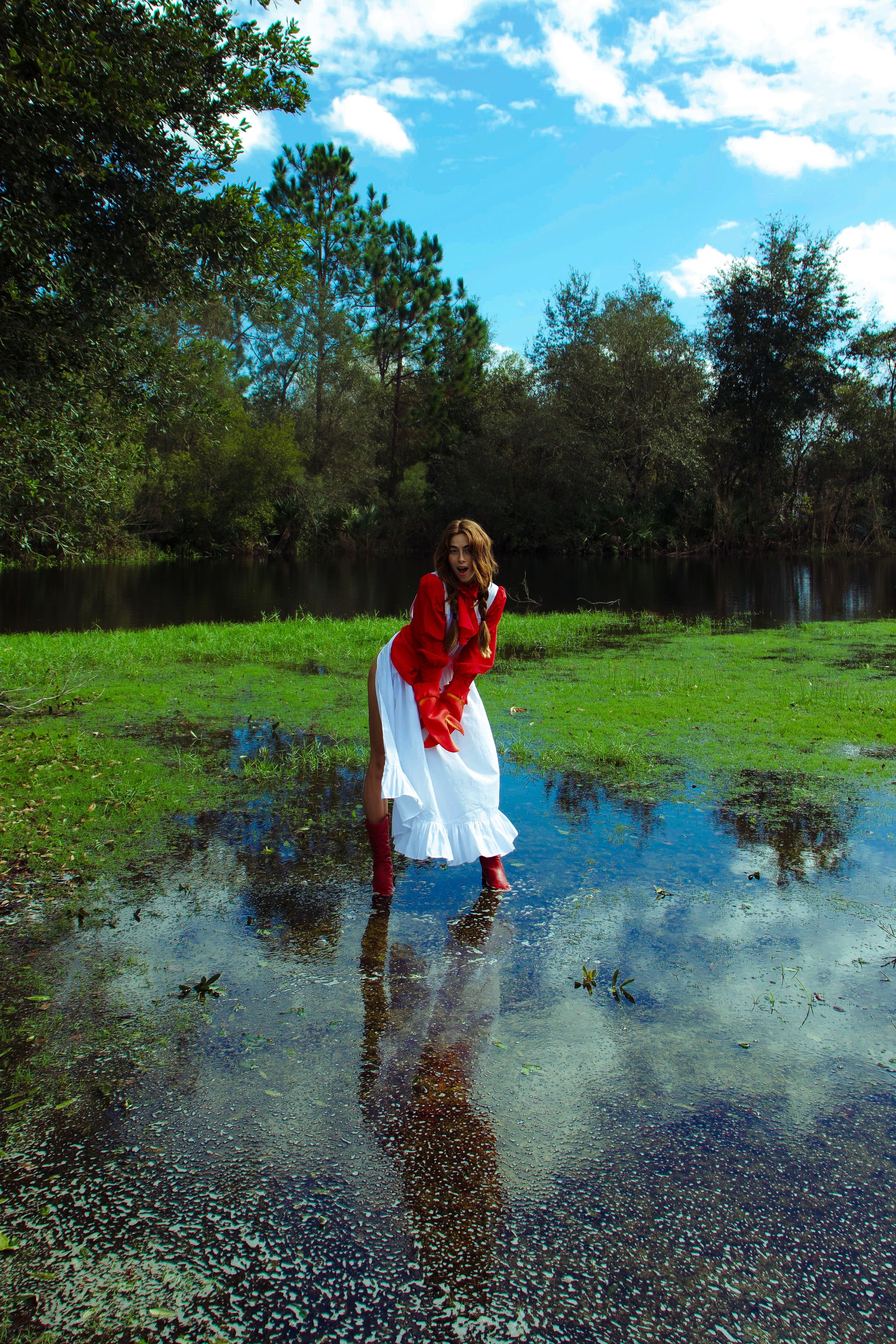 Woman Posing in Water on Swamp · Free Stock Photo