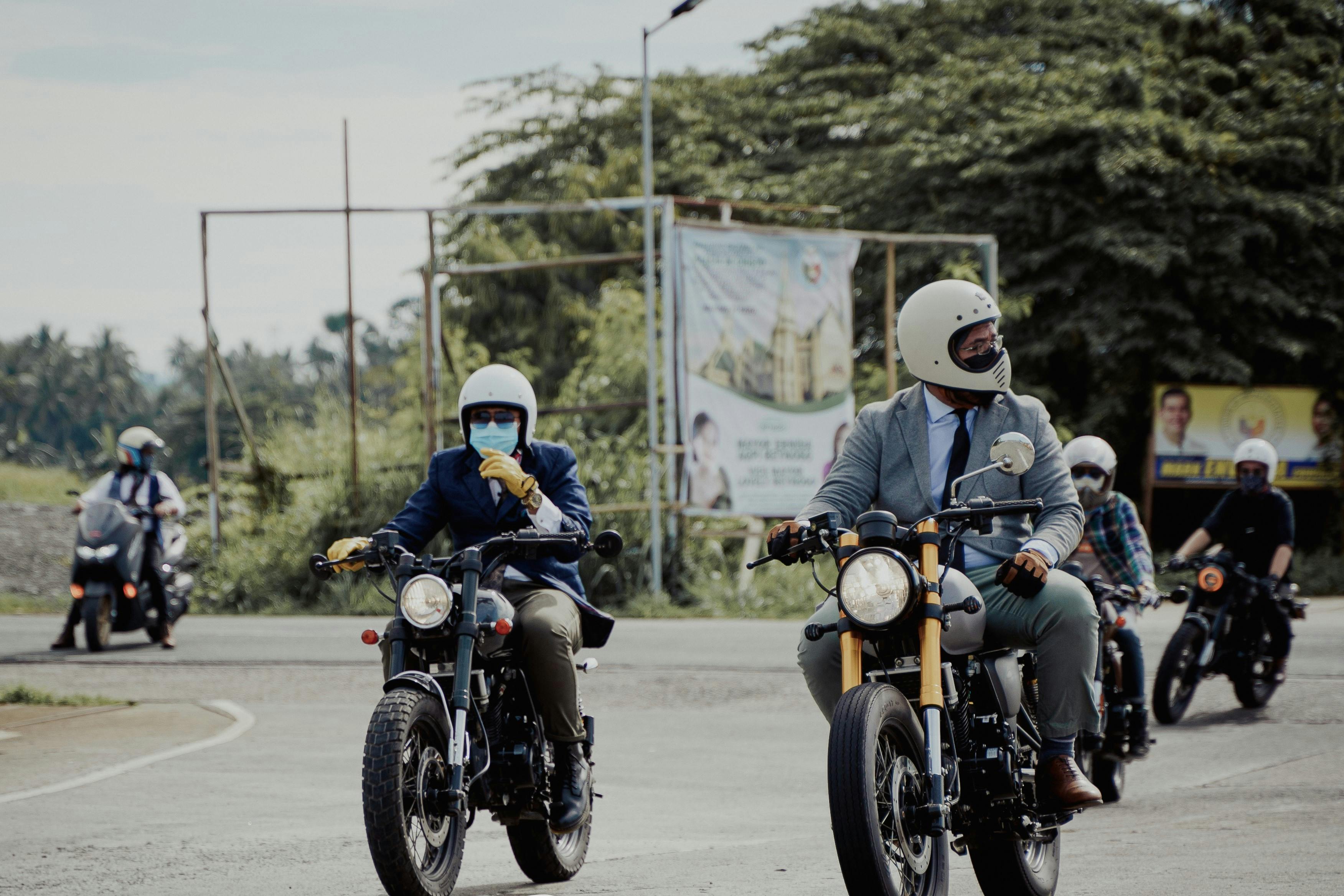 Men in Suits Riding Motorbikes · Free Stock Photo