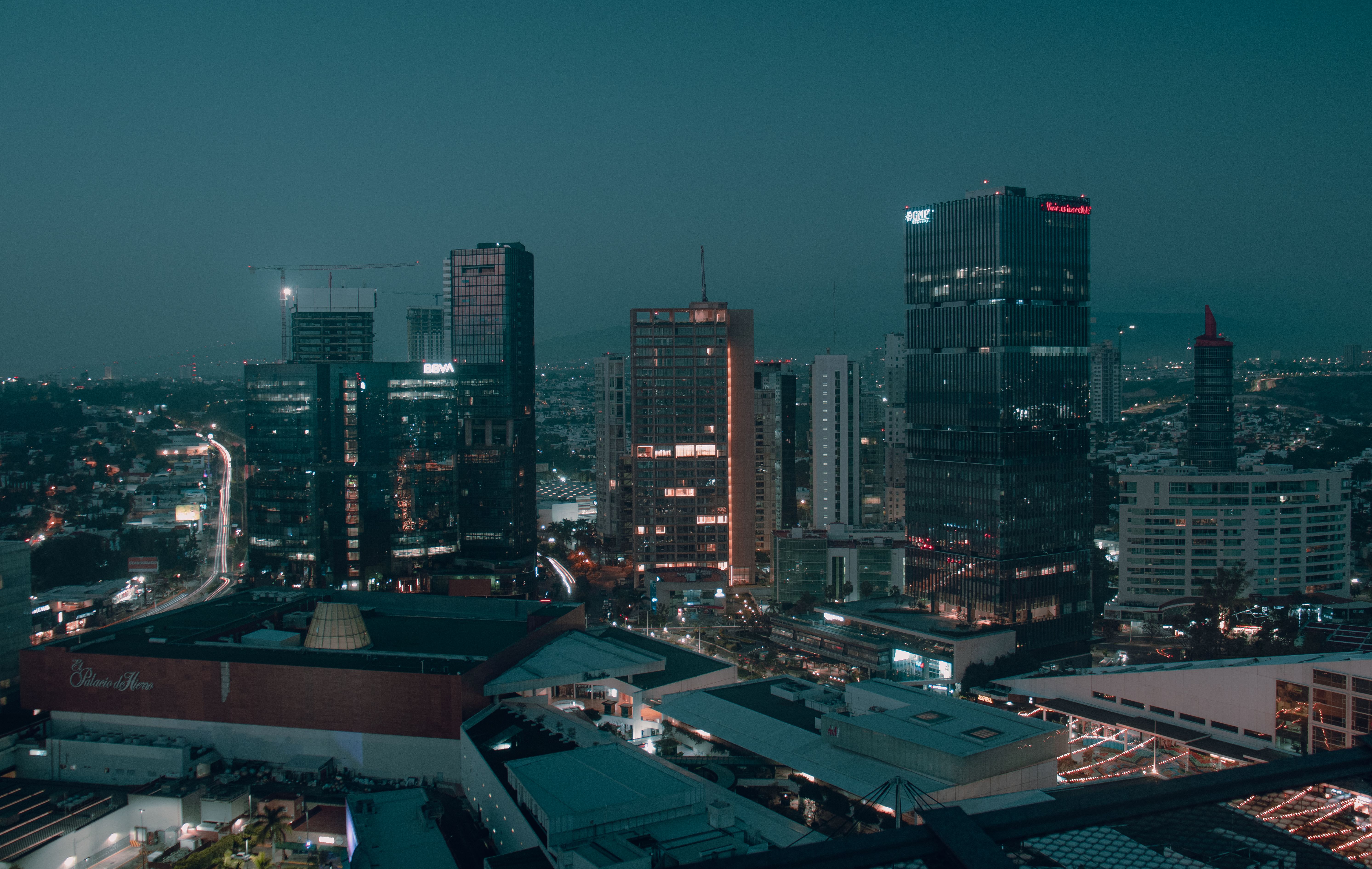 Buildings in City at Night · Free Stock Photo