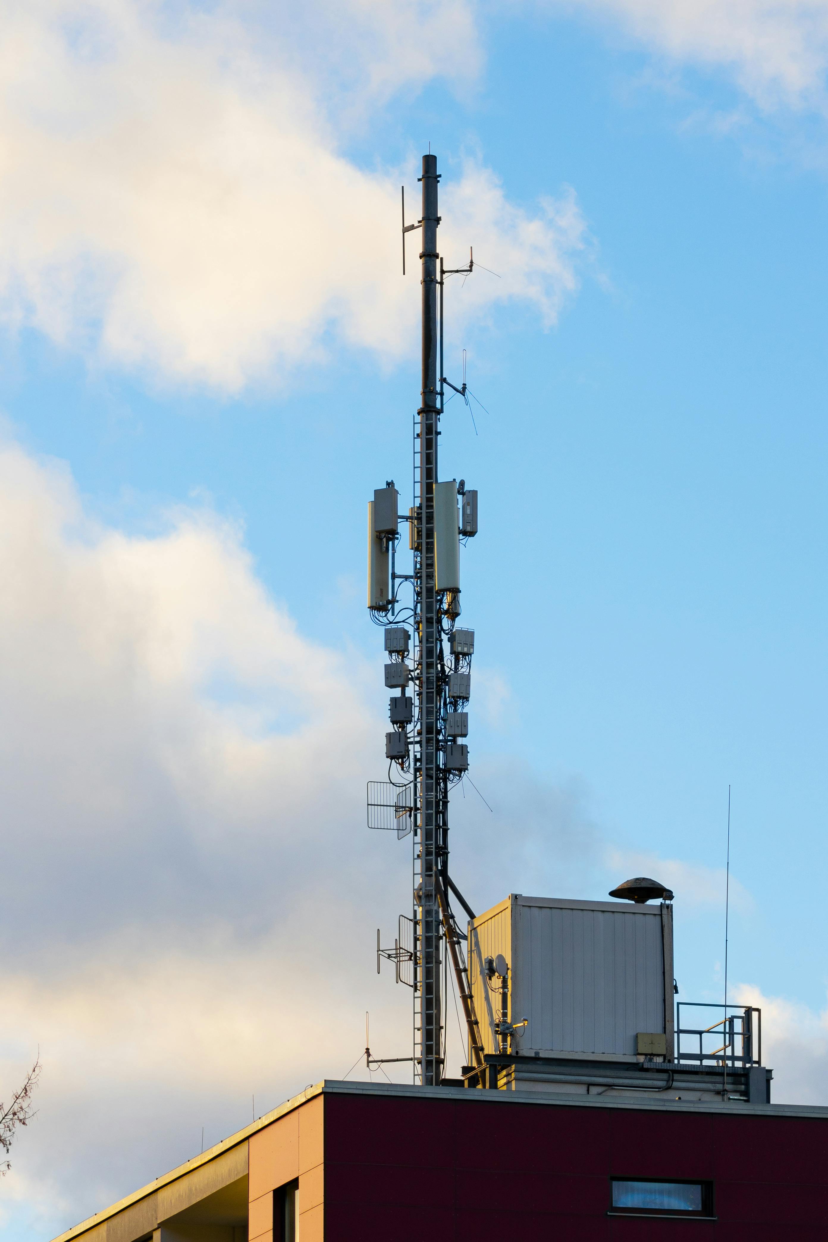 Antenna on Building Roof · Free Stock Photo