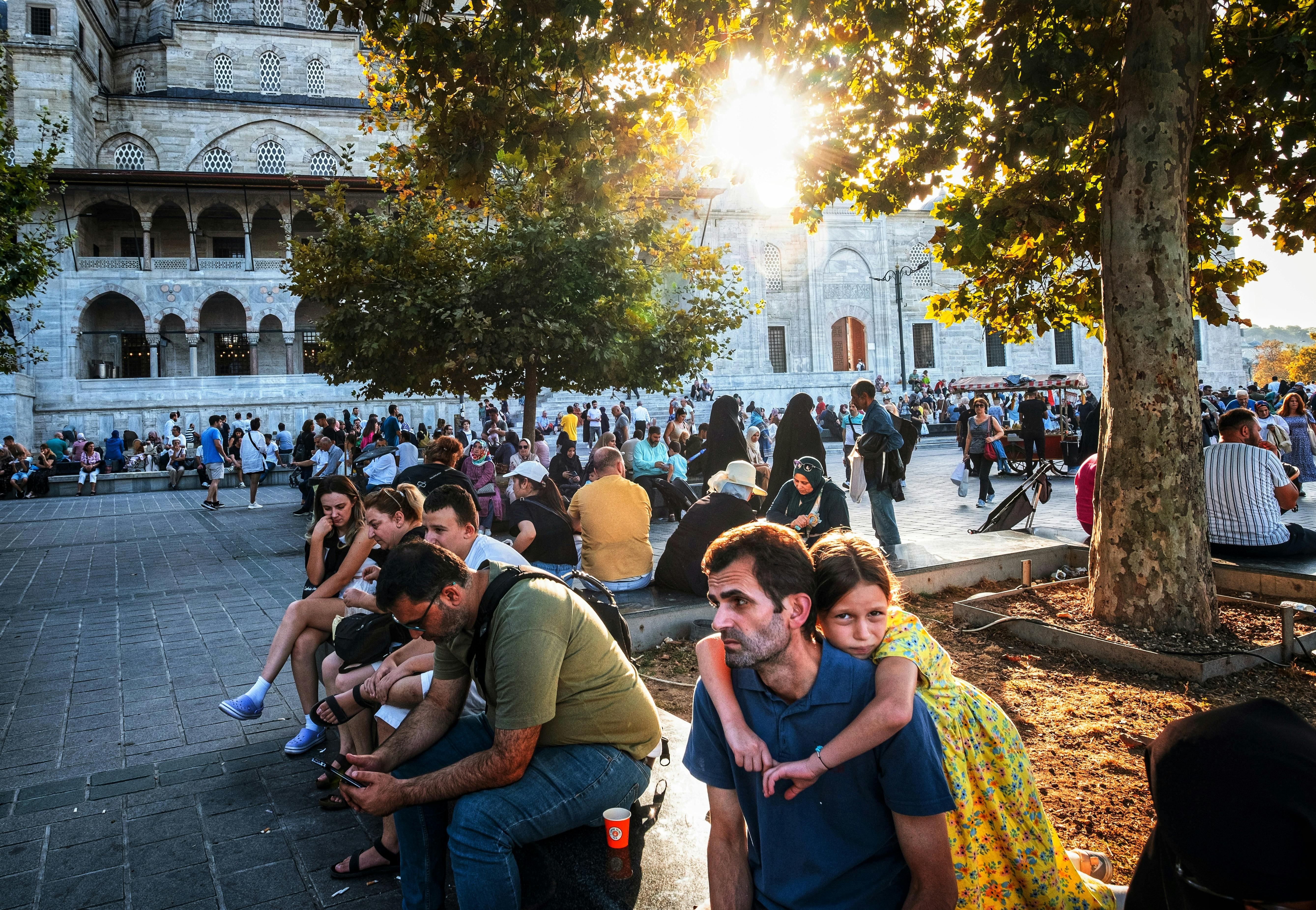 People Sitting on Square near Hagia Sophia at Sunset · Free Stock Photo