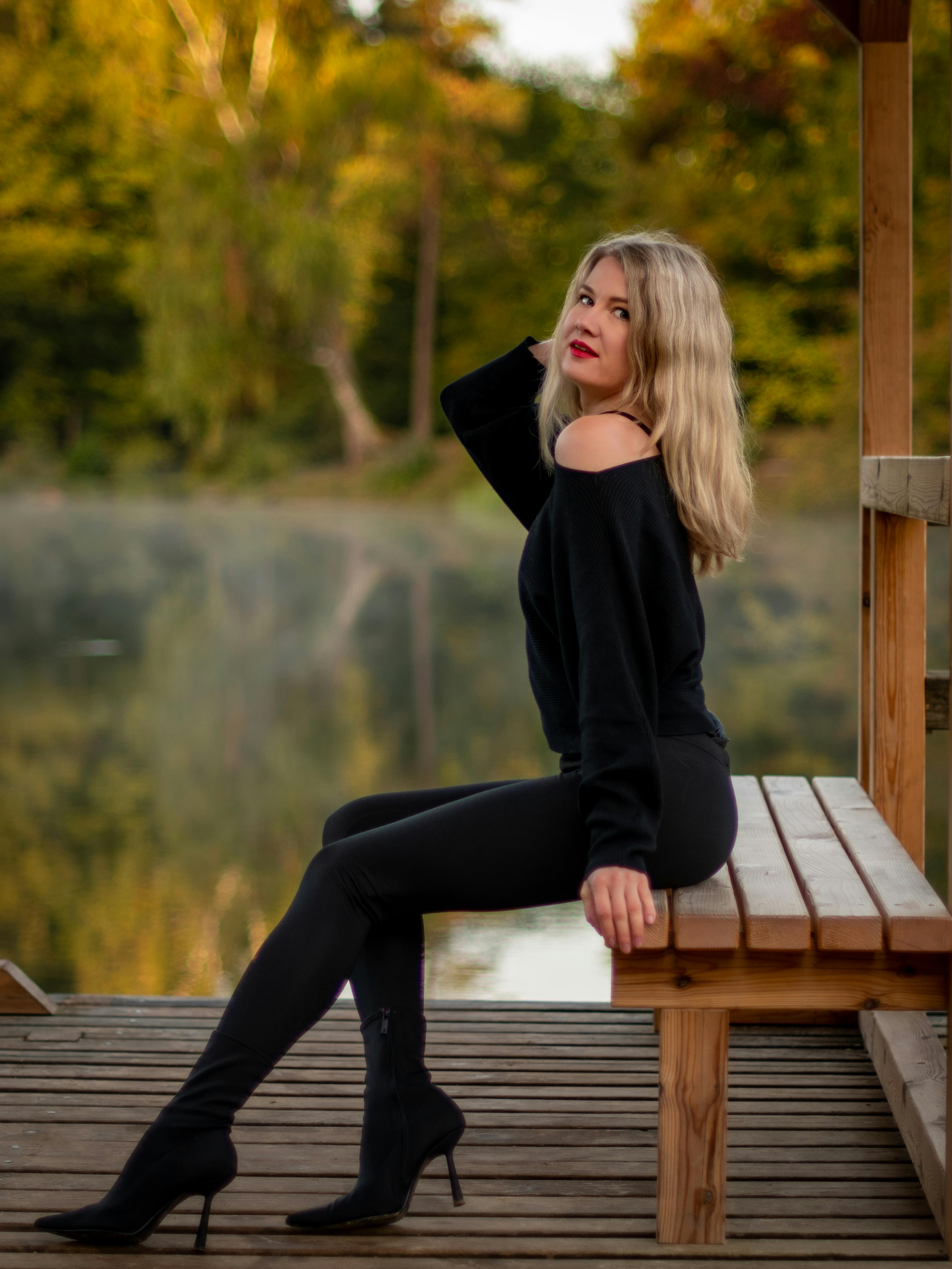 Blonde Woman Sitting on Bench · Free Stock Photo