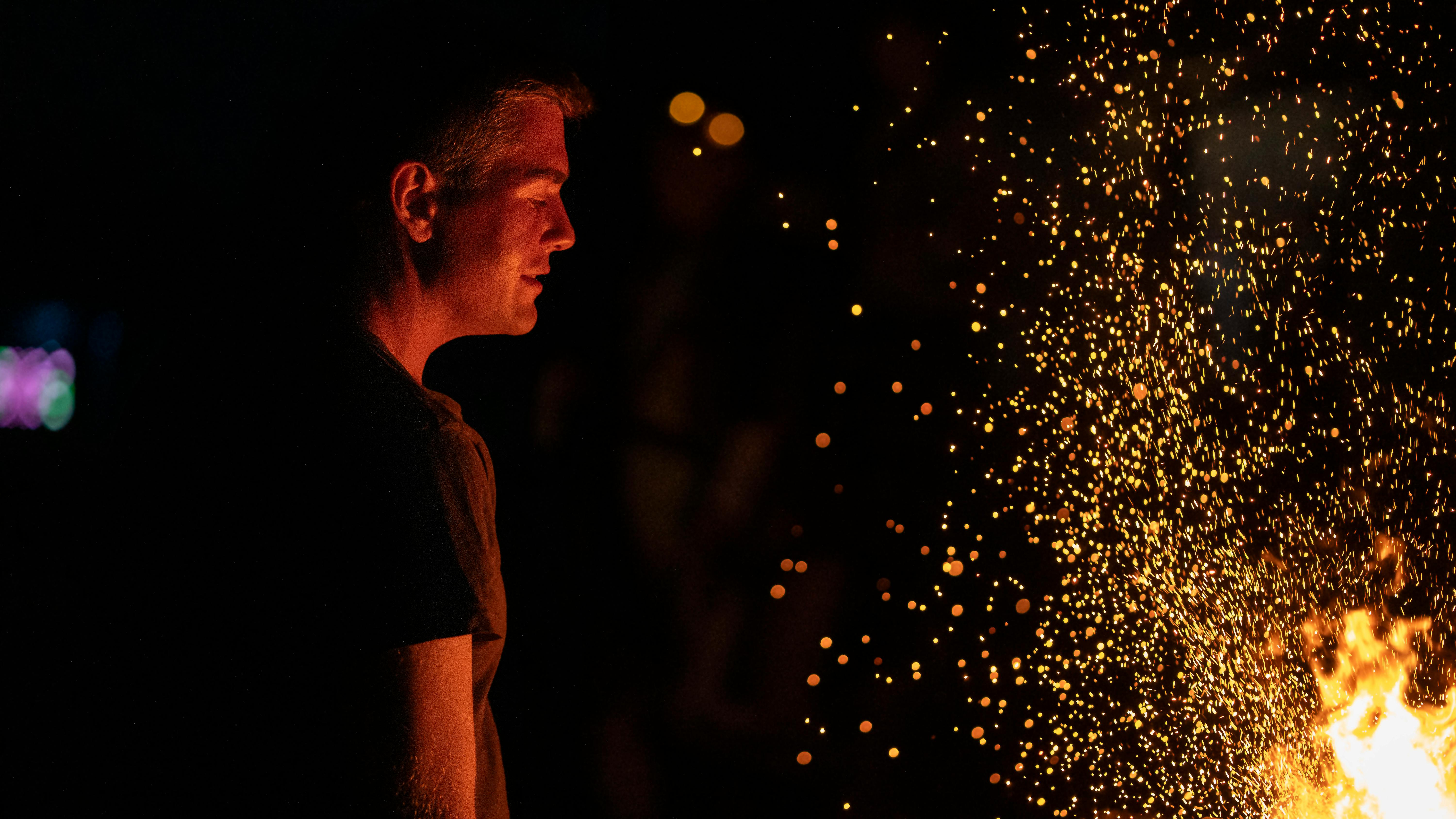 A Man Watching the Campfire · Free Stock Photo