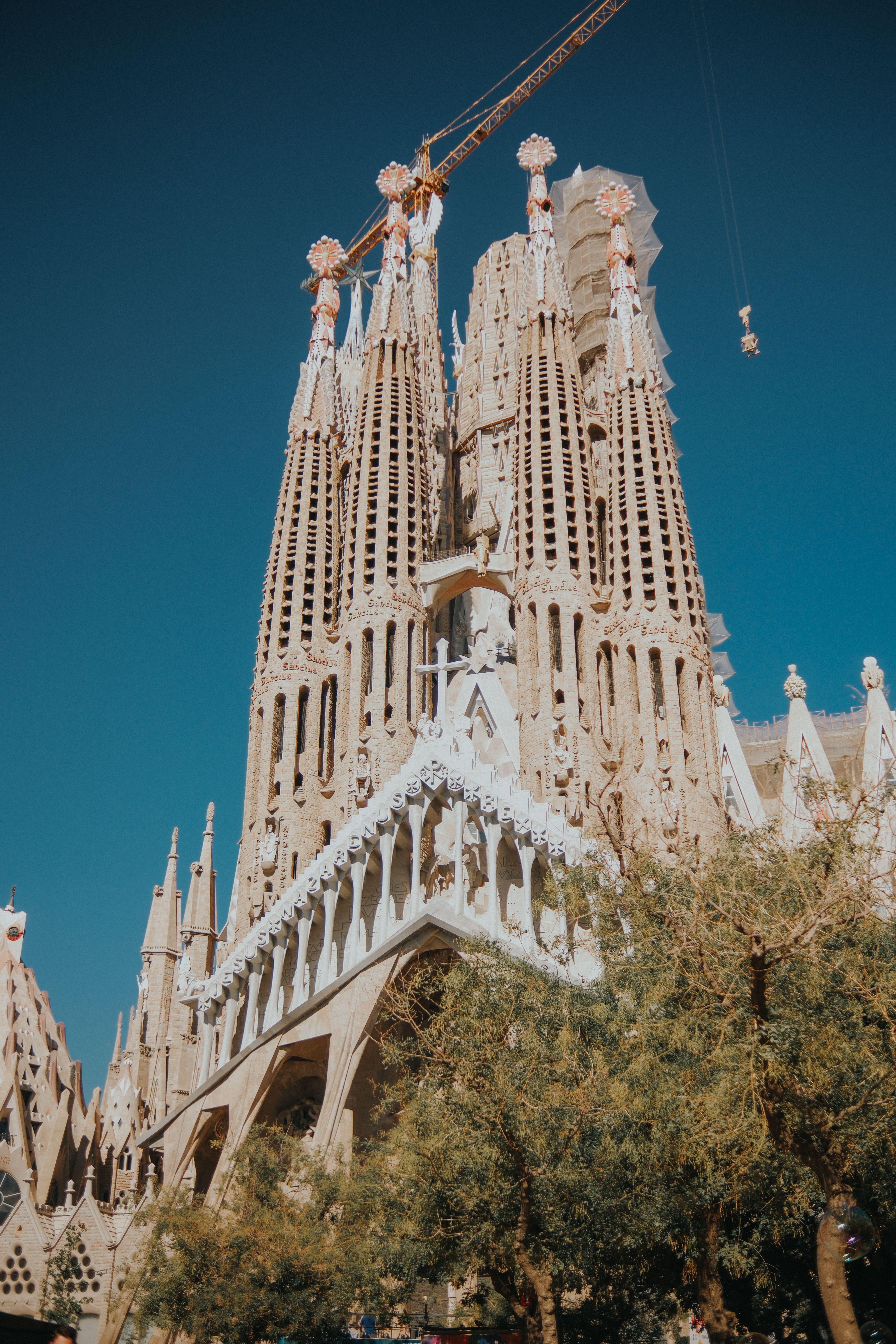 Ornamental facade of old catholic cathedral · Free Stock Photo