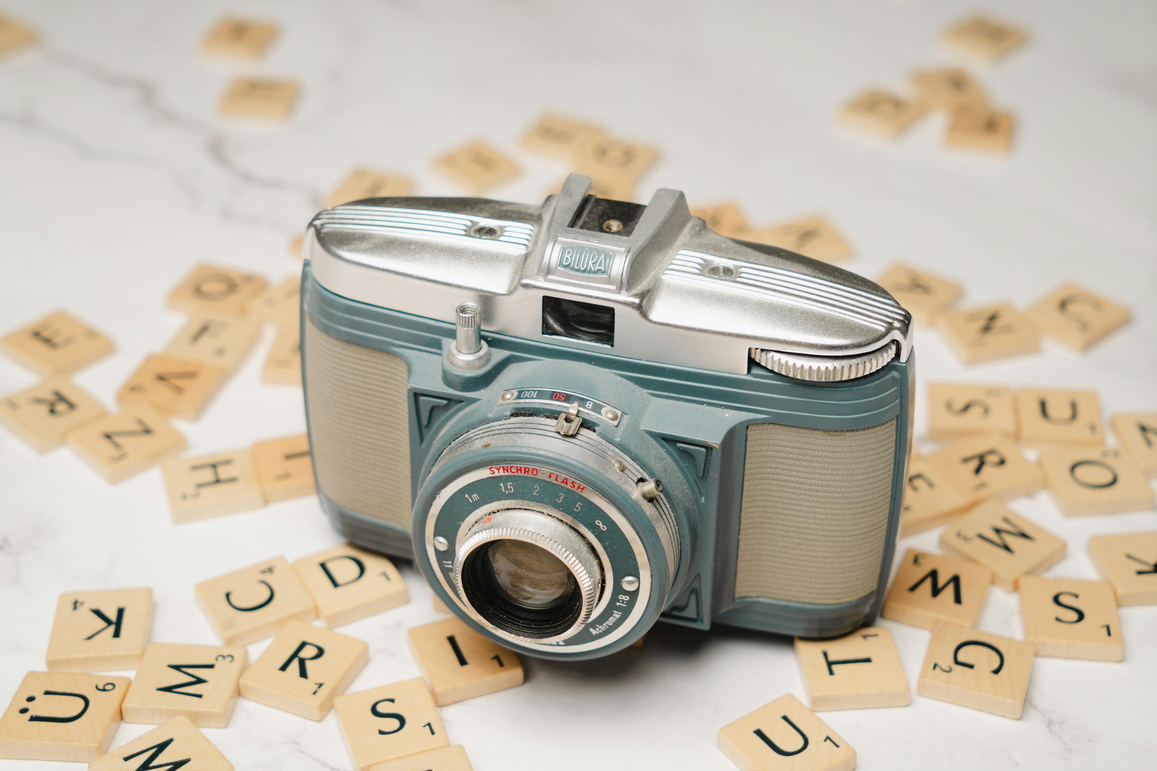 An old camera with a wooden block spelling out the word camera · Free ...