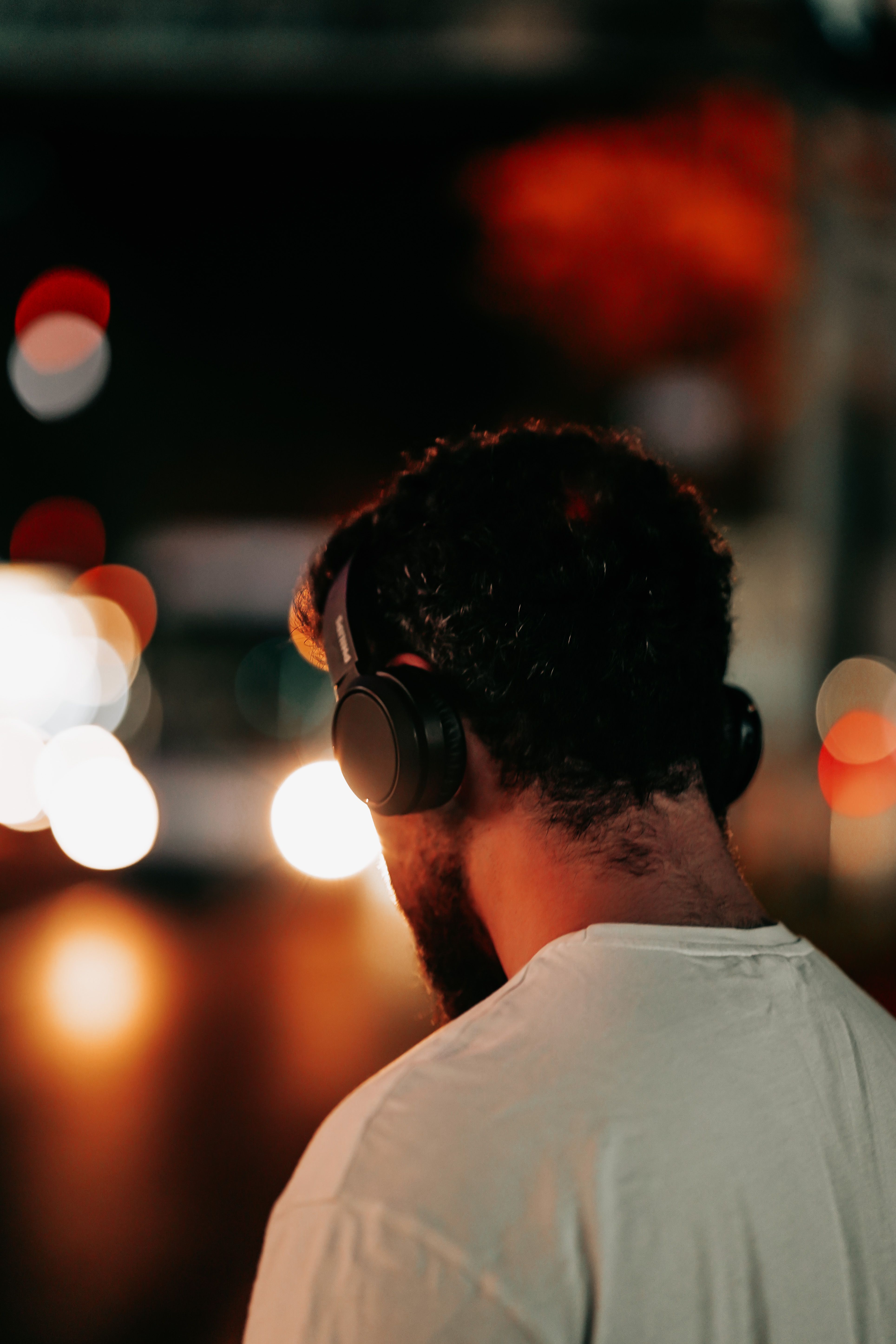 Back View of Man in Headphones · Free Stock Photo