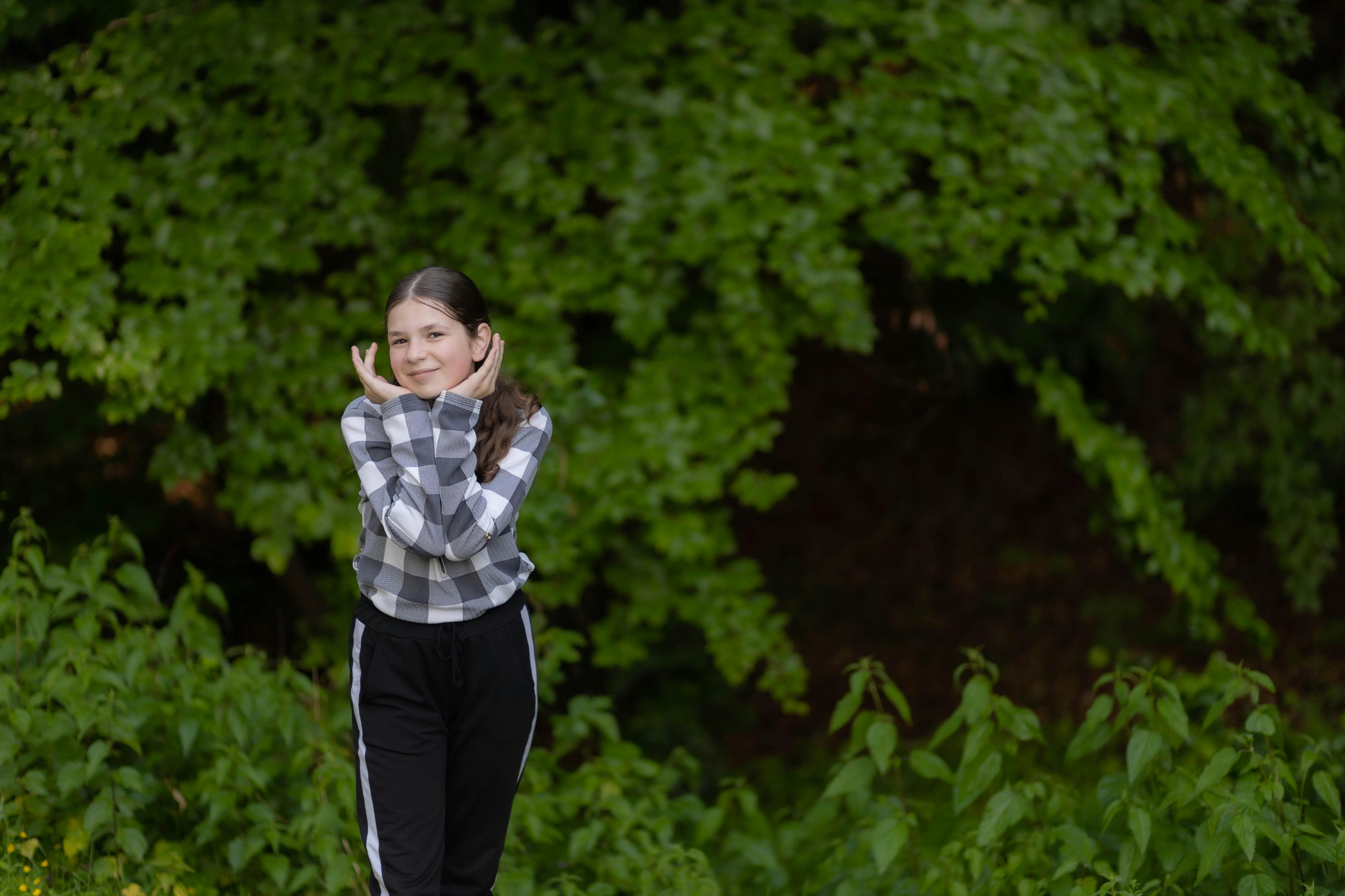 Teenage Girl with a Baseball Bat · Free Stock Photo
