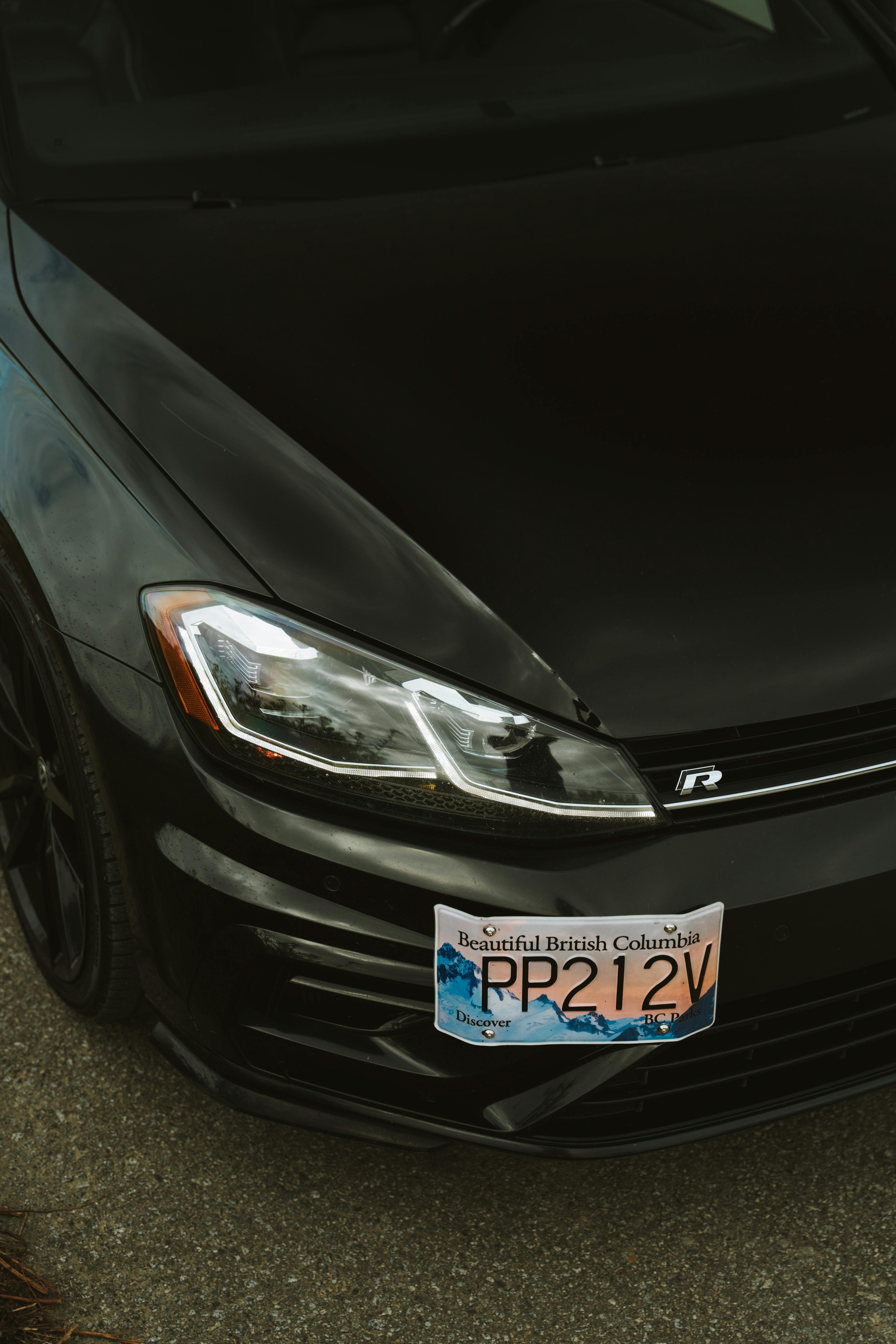 Photo of a Car Engine Bay and Headlight · Free Stock Photo