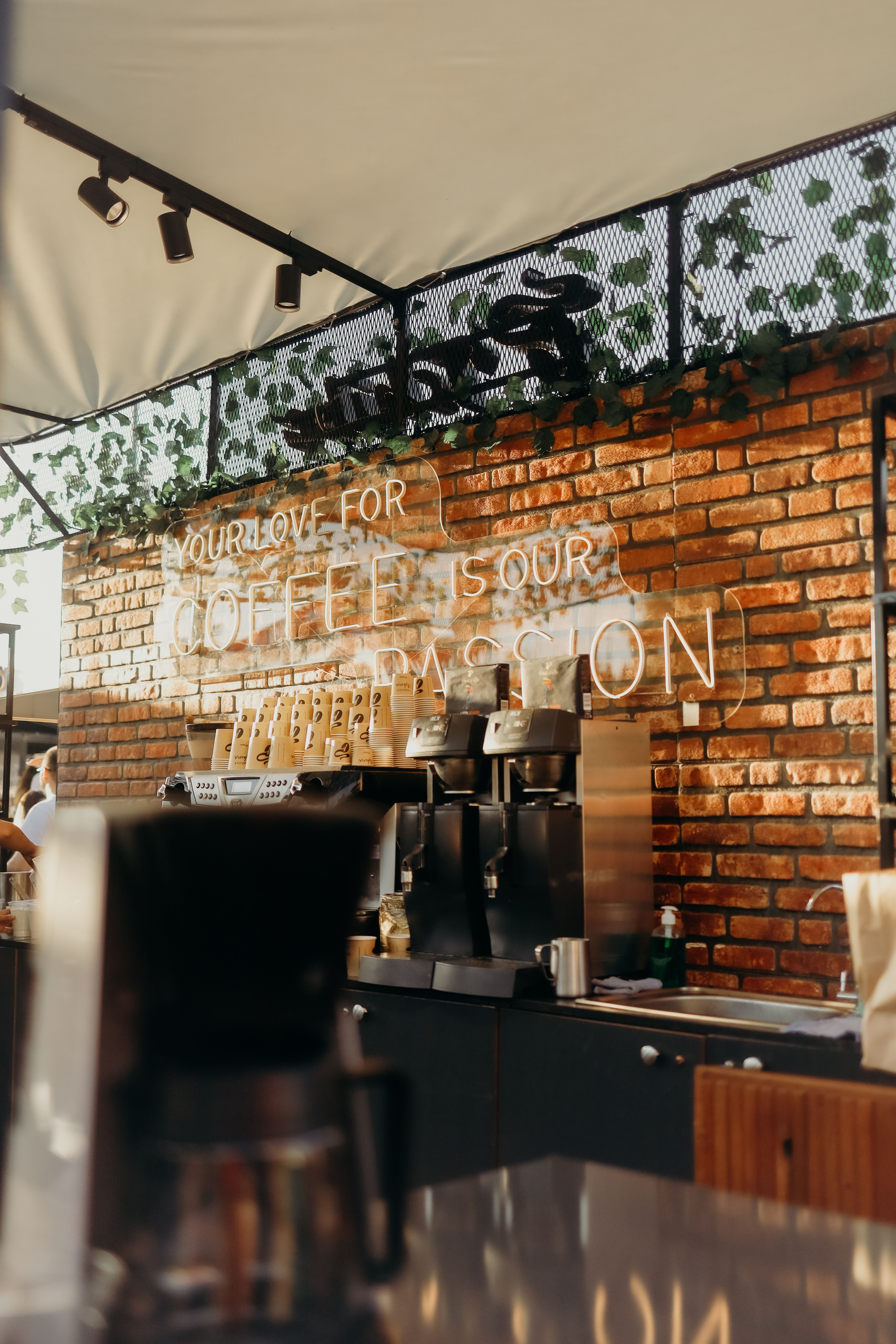 Interior of a Modern Stylish Cafe with Coffee Machines · Free Stock Photo