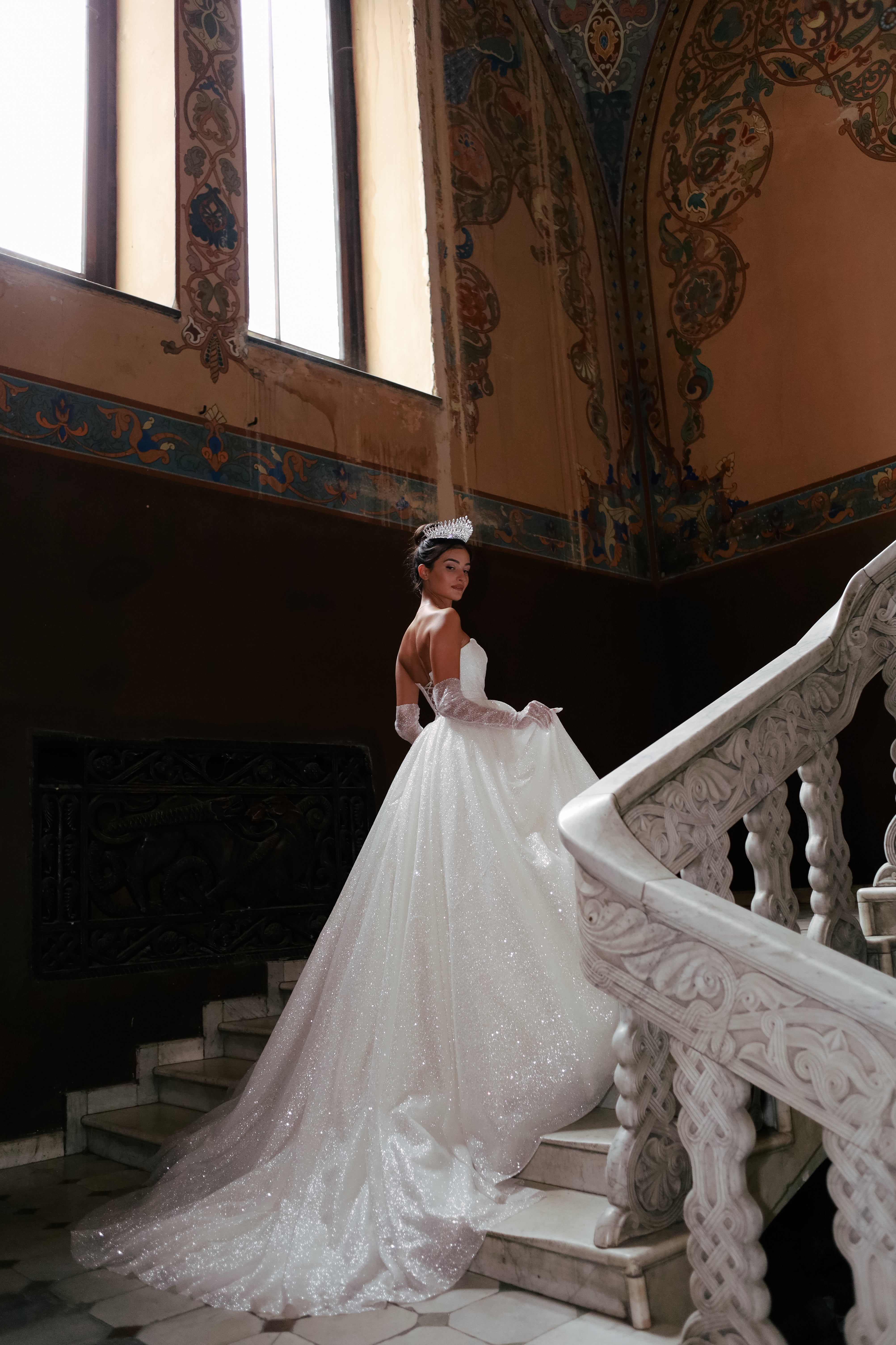 The Bride Standing Inside a Building with Mosaics · Free Stock Photo