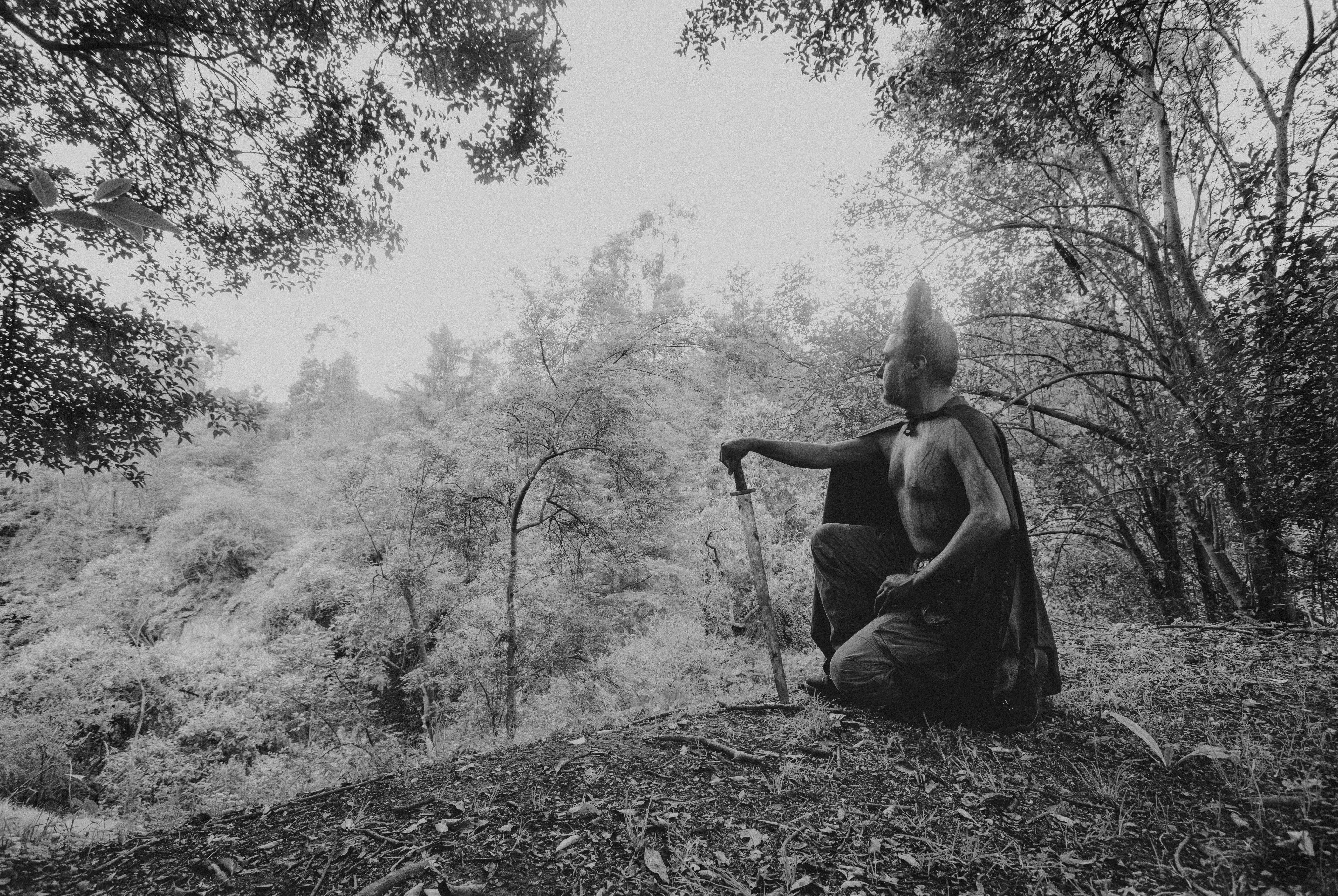 Kneeling Devil with Sword · Free Stock Photo