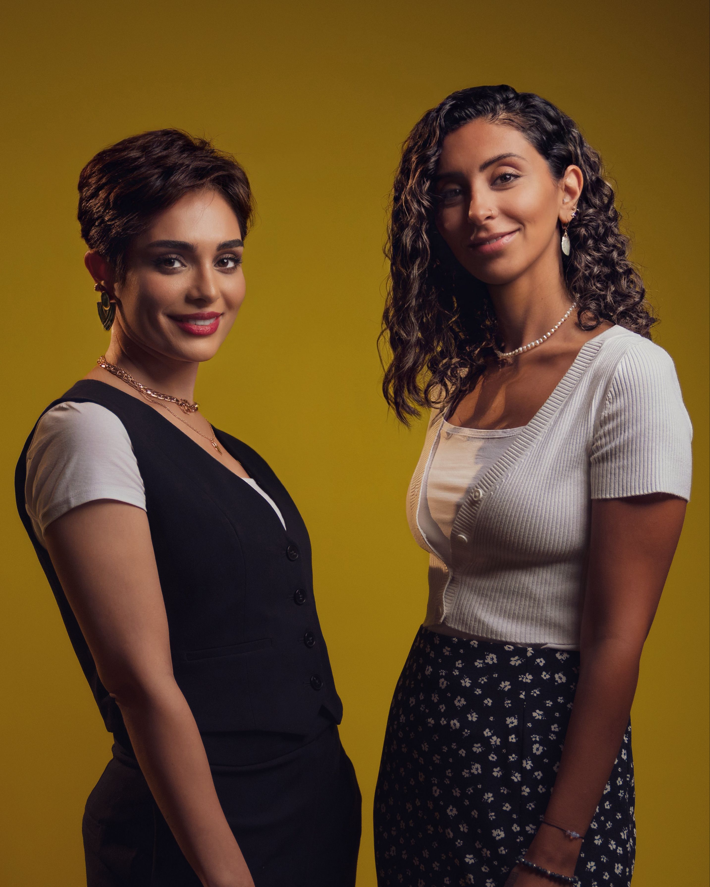 Two Women Posing in a Studio · Free Stock Photo