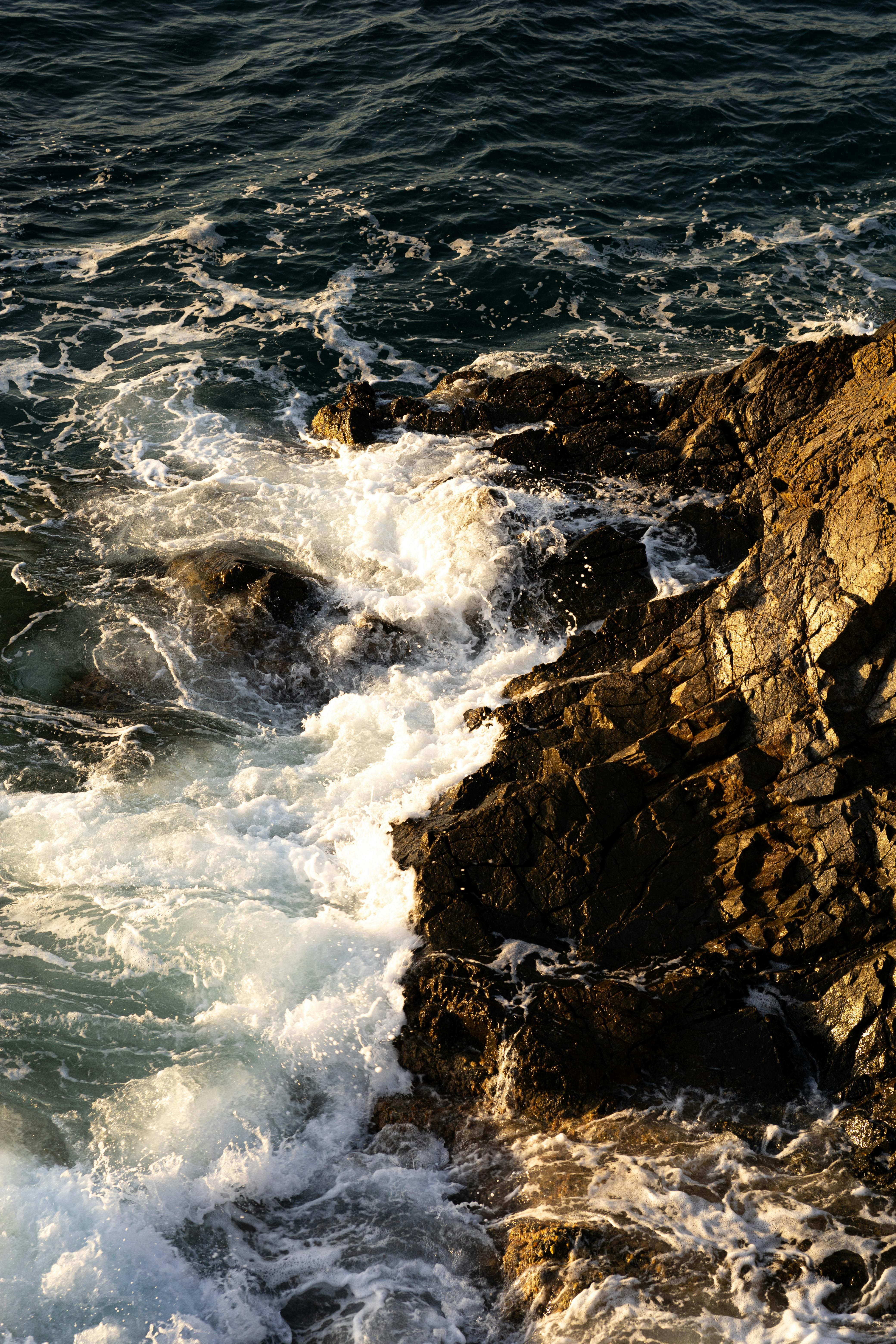 Wave Crushing on Rocks on Shore · Free Stock Photo