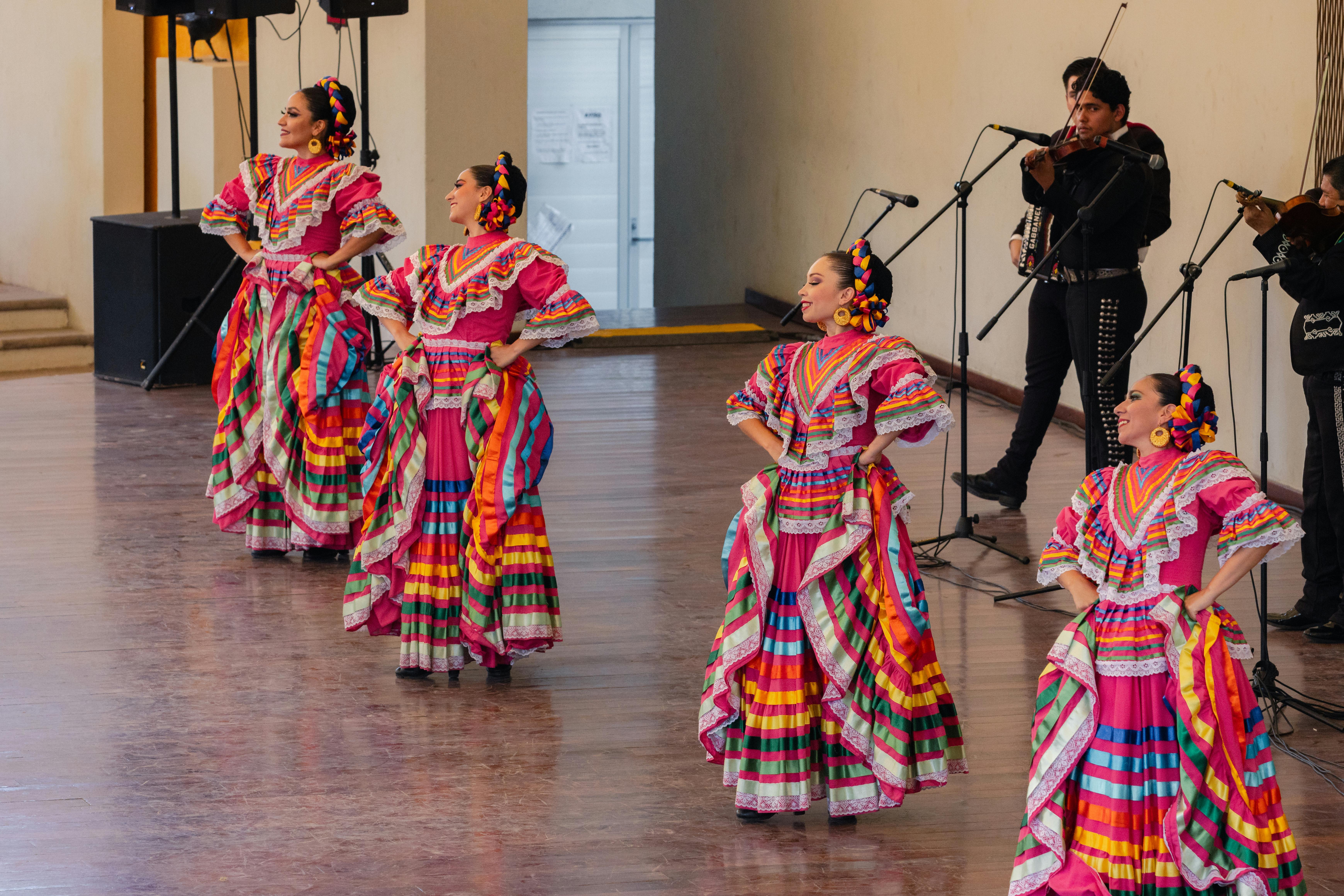 Women in Traditional Clothing Dancing · Free Stock Photo