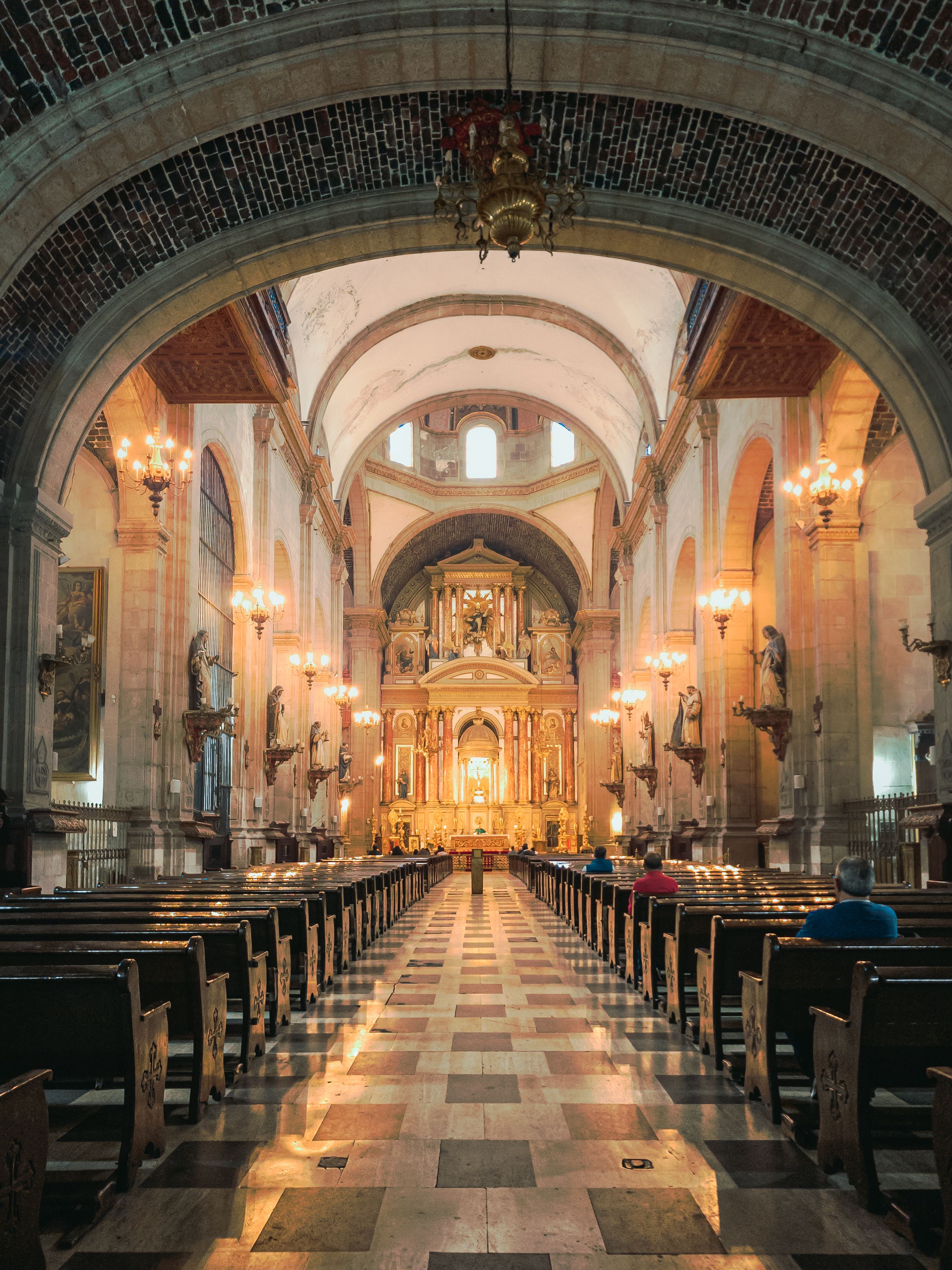 Interior of old Catholic cathedral with domed ceiling · Free Stock Photo