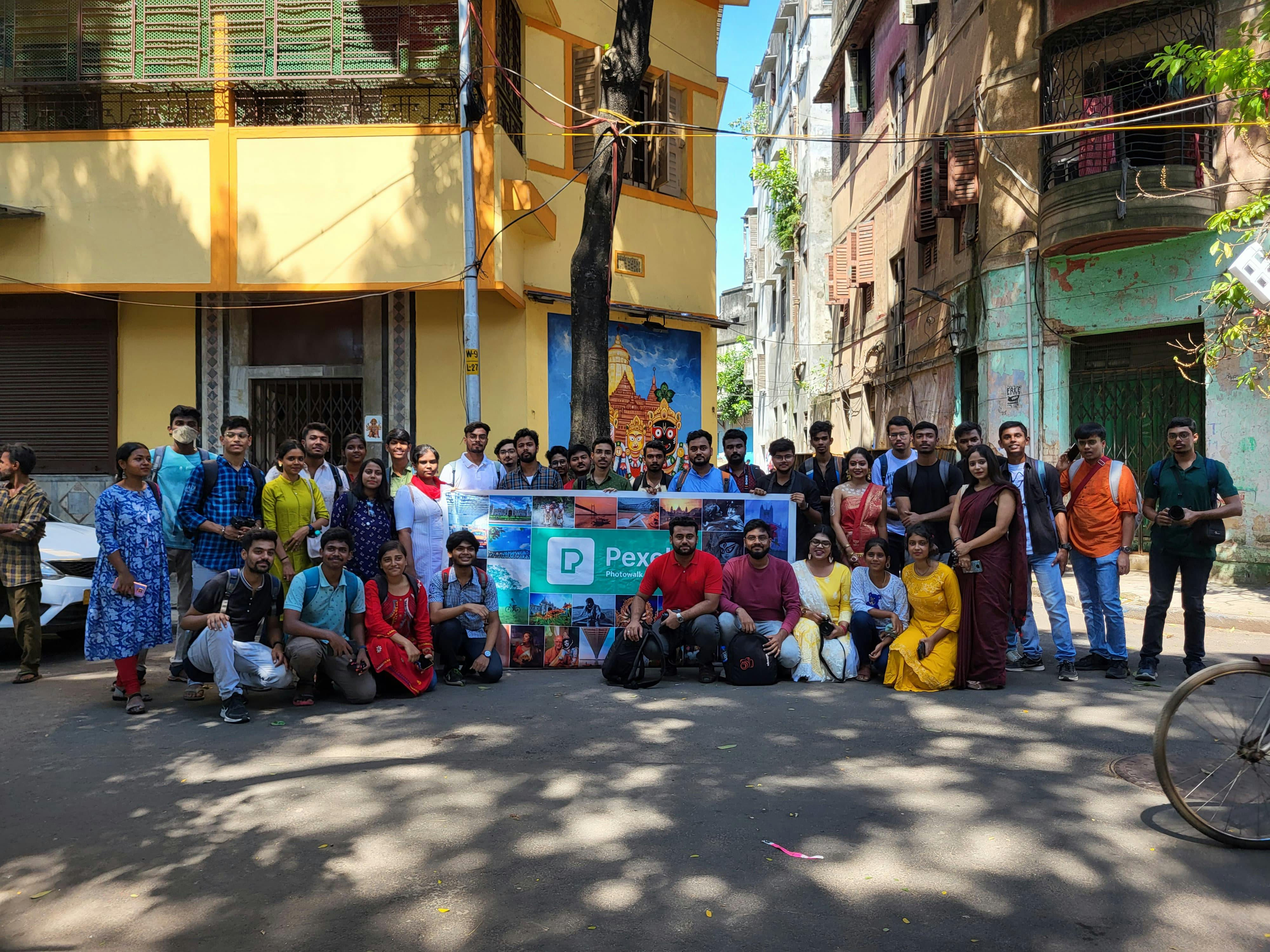 Group of Photographers with Pexels Banner in Kolkata · Free Stock Photo
