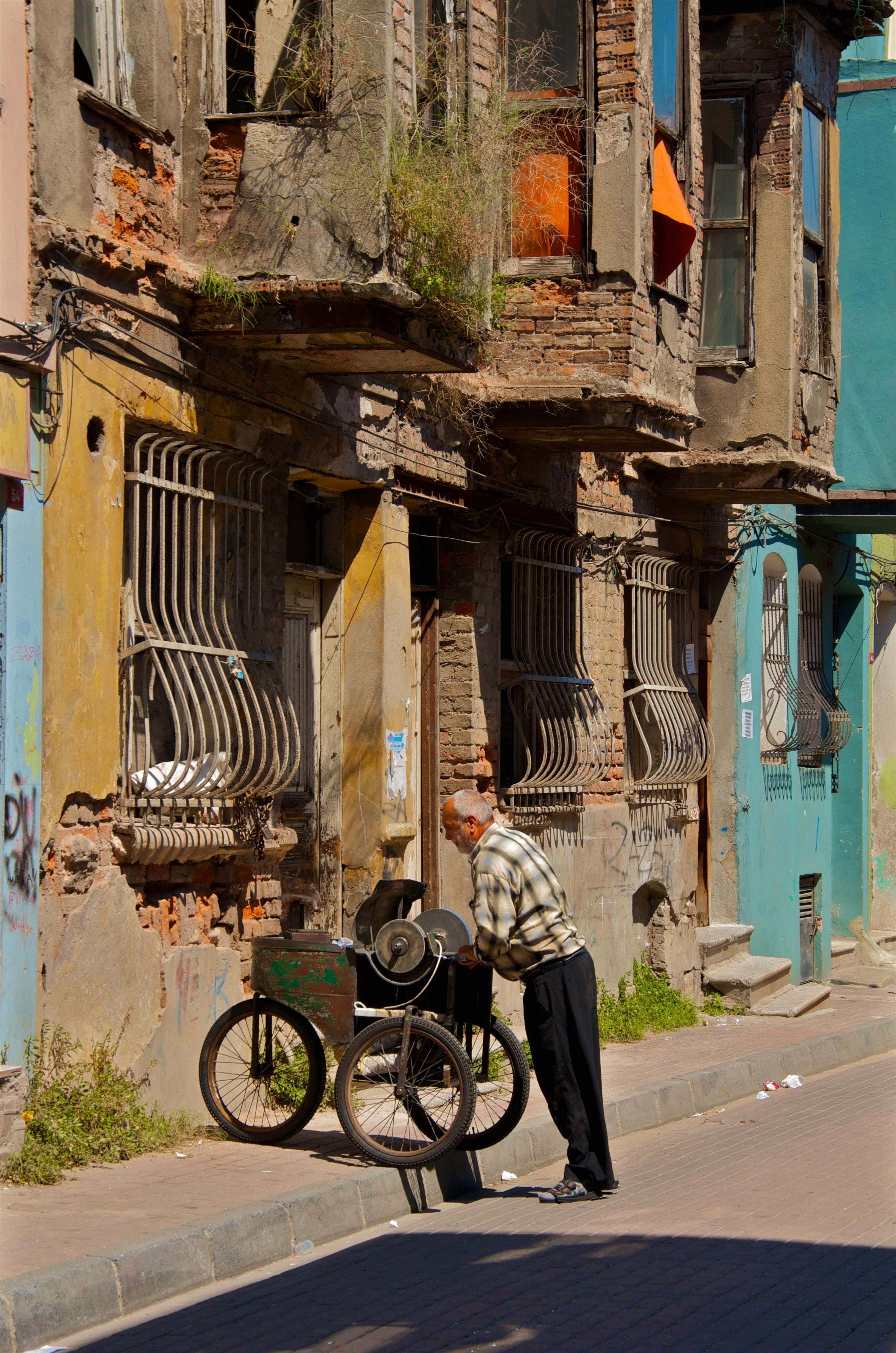 Man Pulling a Cart on a Street in front of a Mosque in Istanbul, Turkey ...