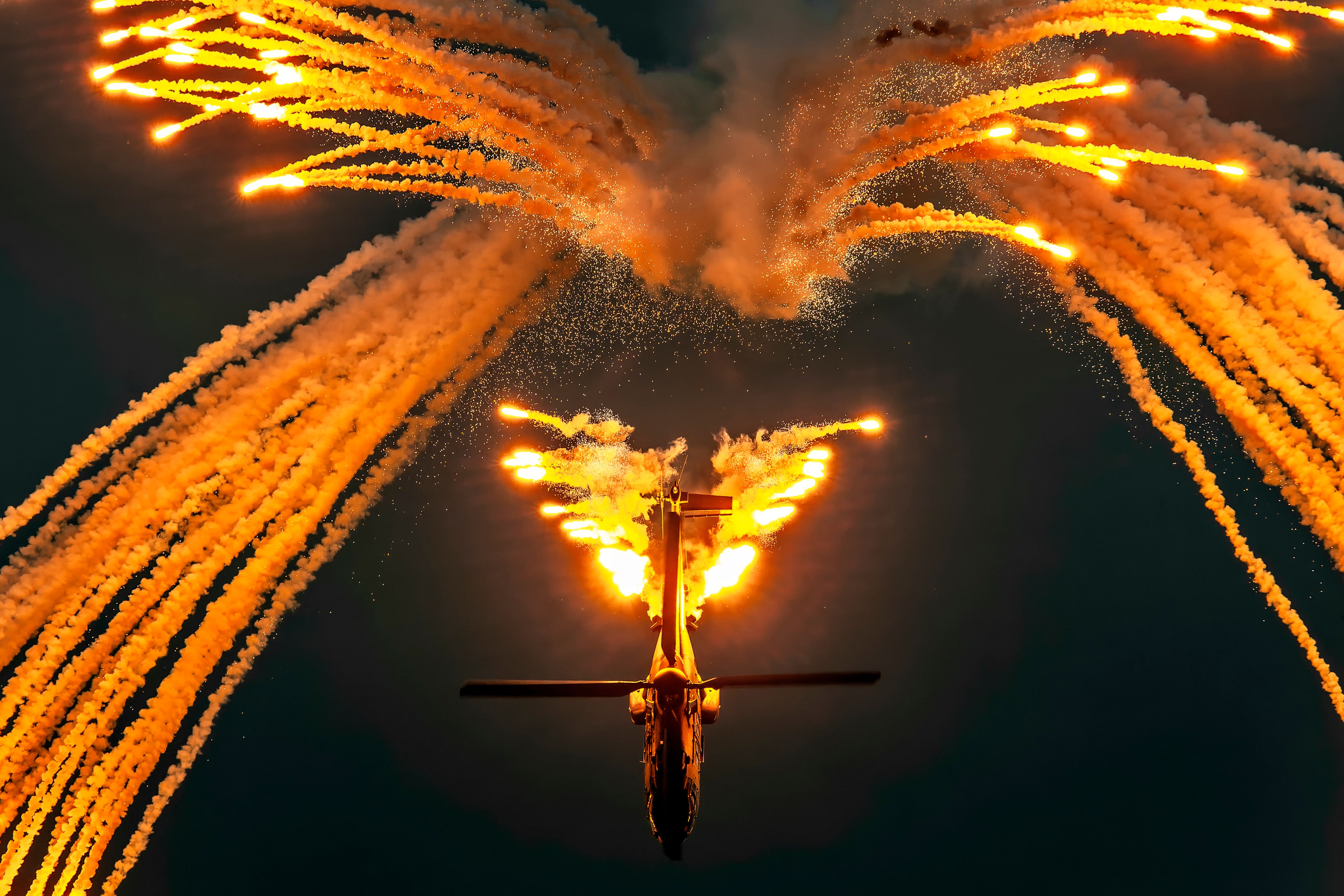 View of Bright Lights and Smoke during an Air Show · Free Stock Photo