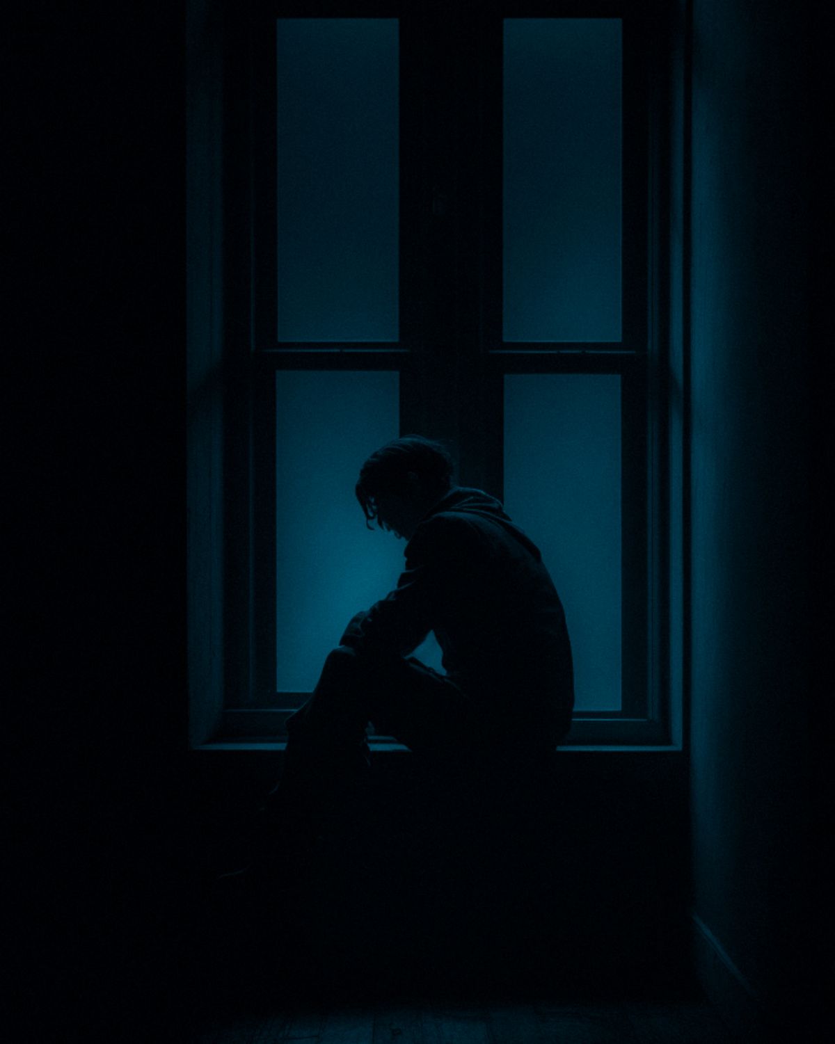 Person Sitting Alone With Soft Light Photos, Download The BEST Free ...