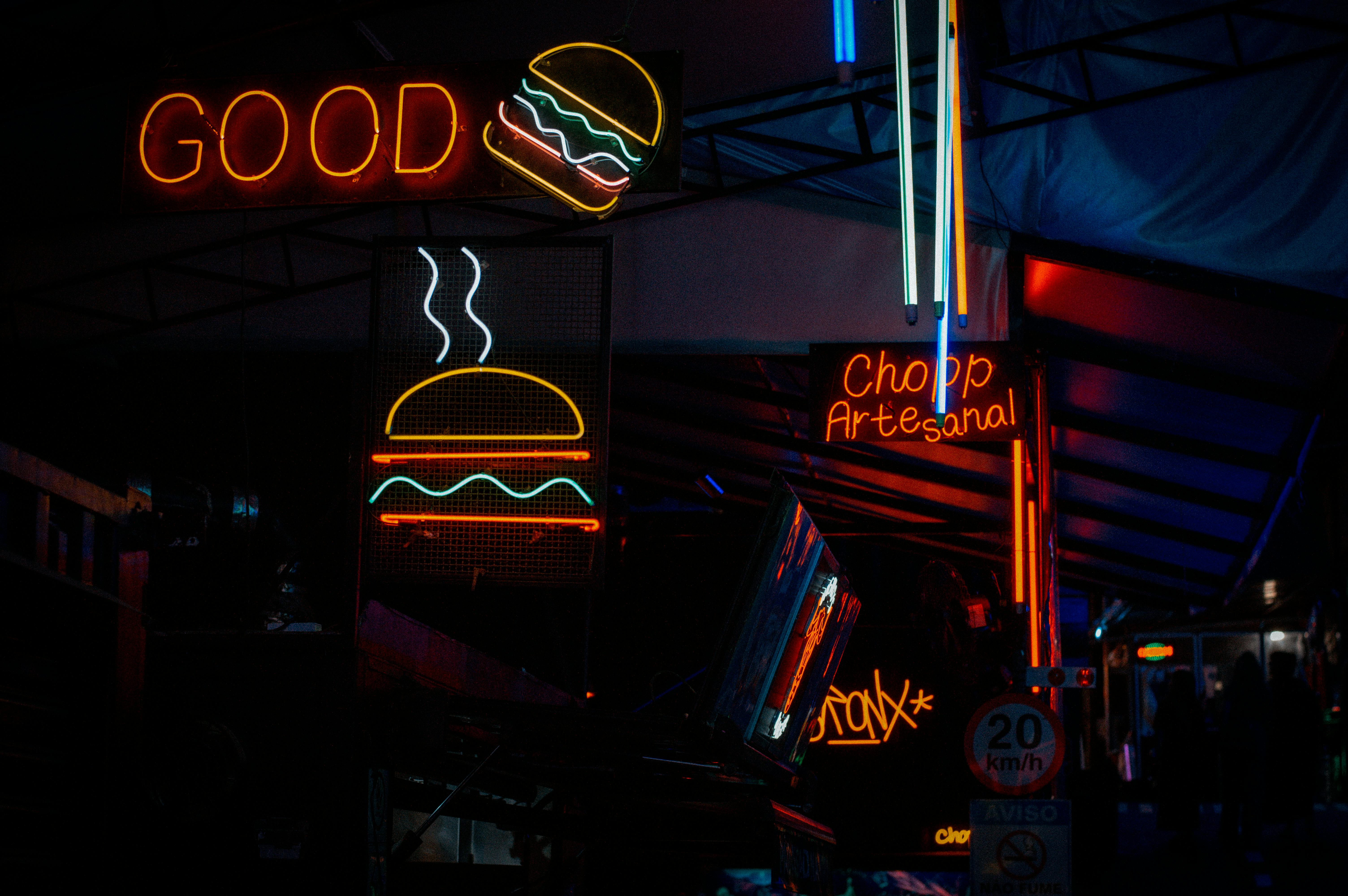 Illuminated Neon Signs of a Restaurant · Free Stock Photo