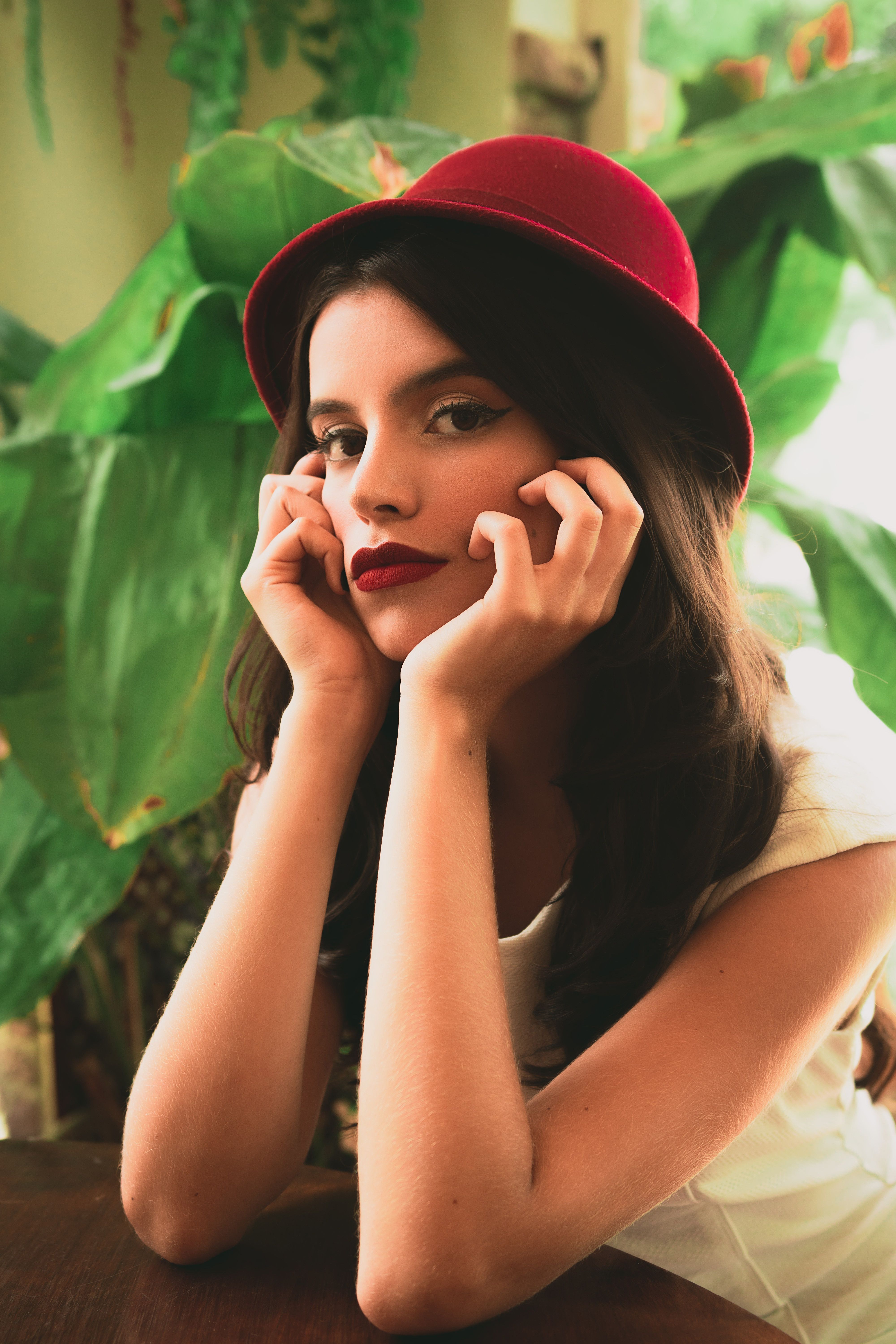 Selective Focus Photography Of Woman Wearing Red And White Puff Sleeved